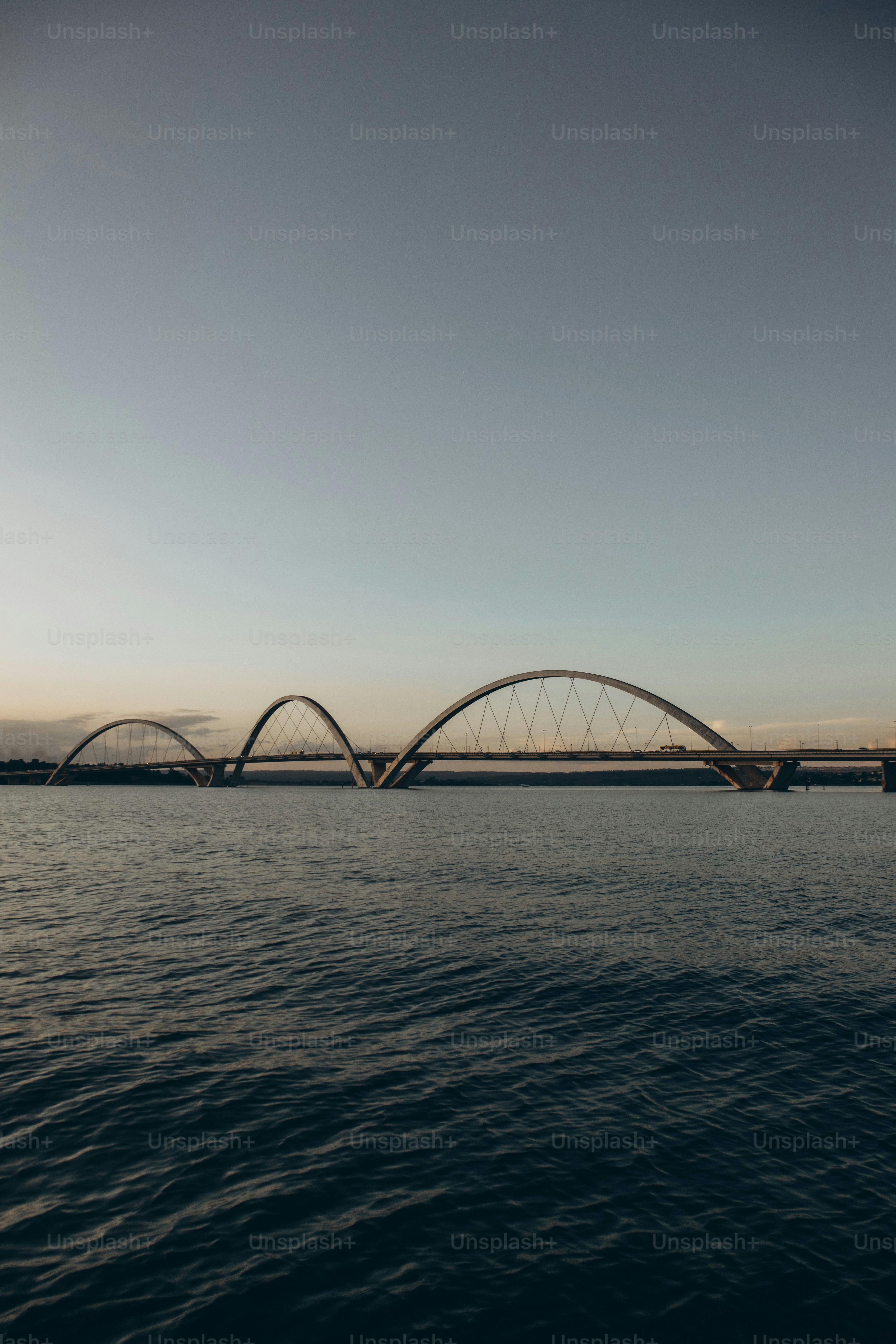 A large bridge over a large body of water photo – Bridge Image on Unsplash