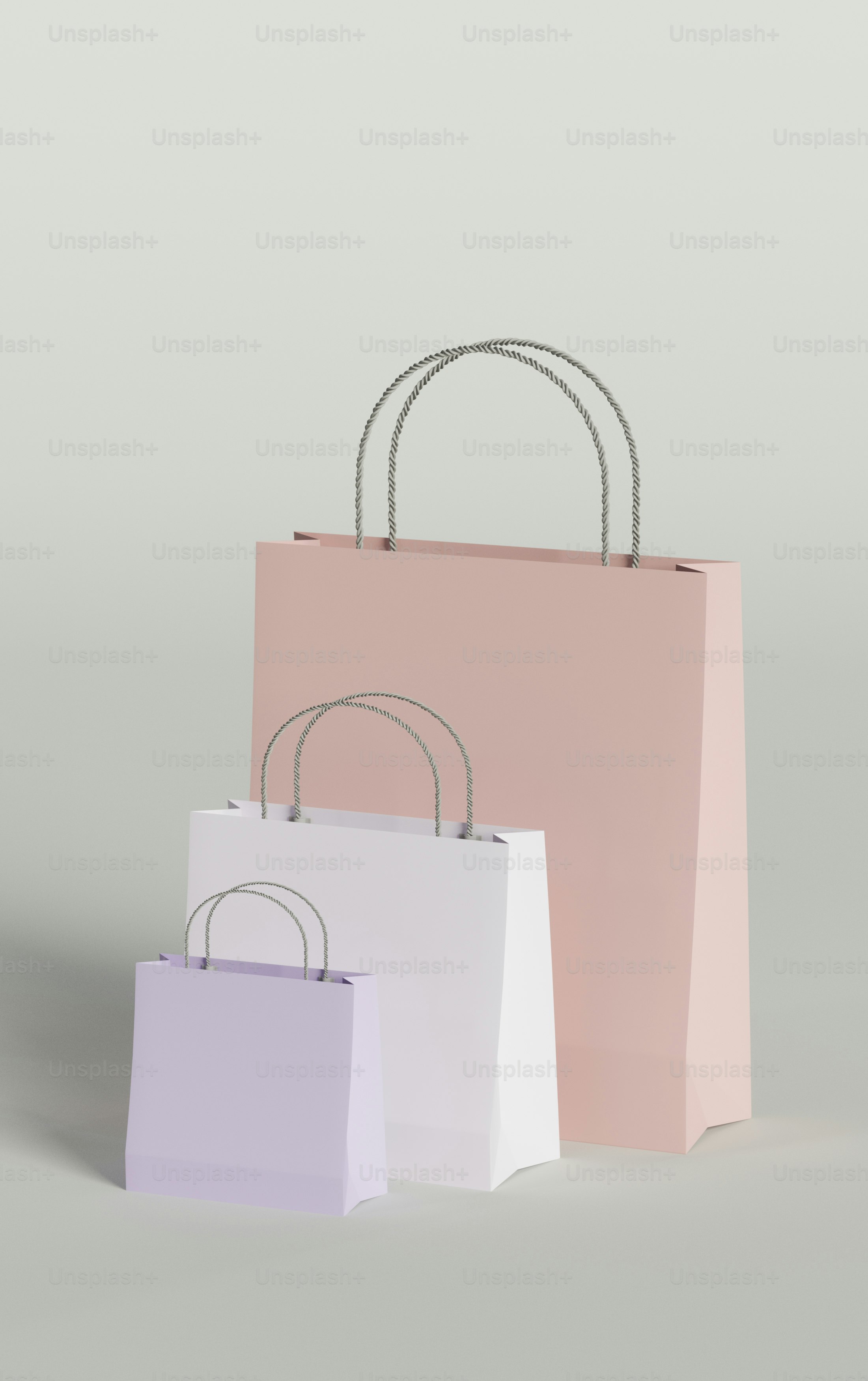 Two small shopping bags sitting next to each other photo – E-commerce ...