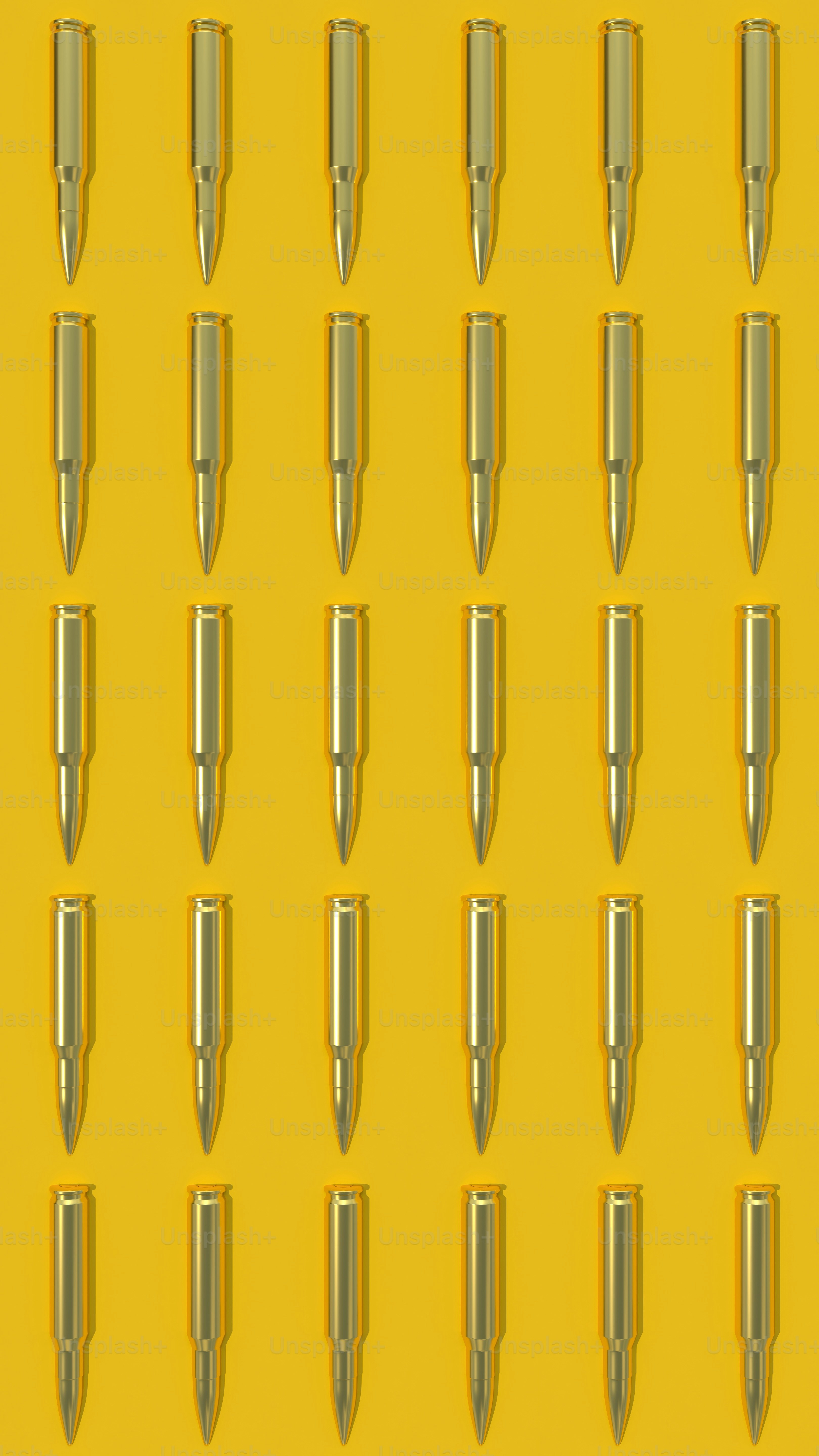 A red background with gold bullet shapes photo – Ammunition Image on ...