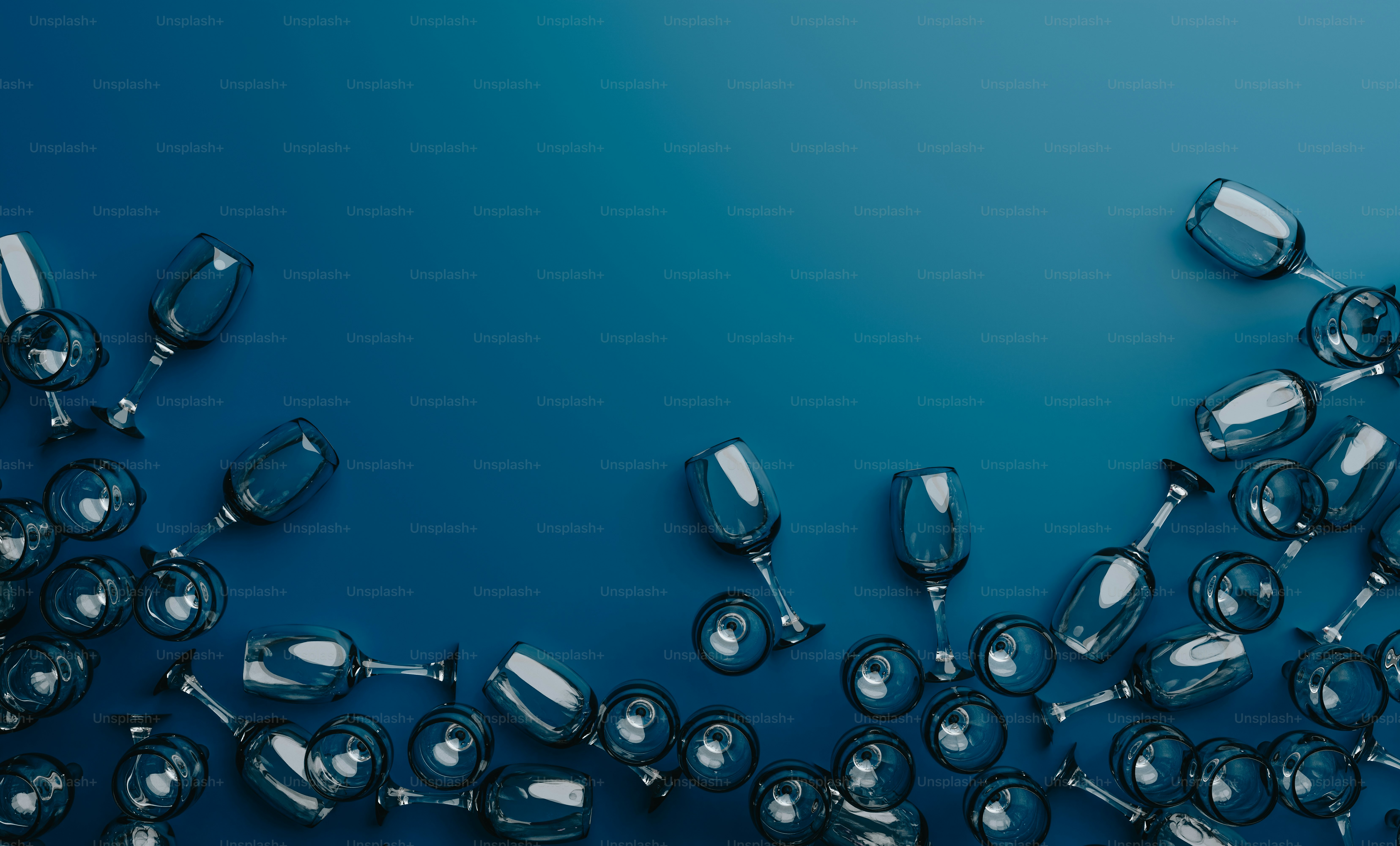 A blue background with a bunch of silver objects photo – Full screen ...