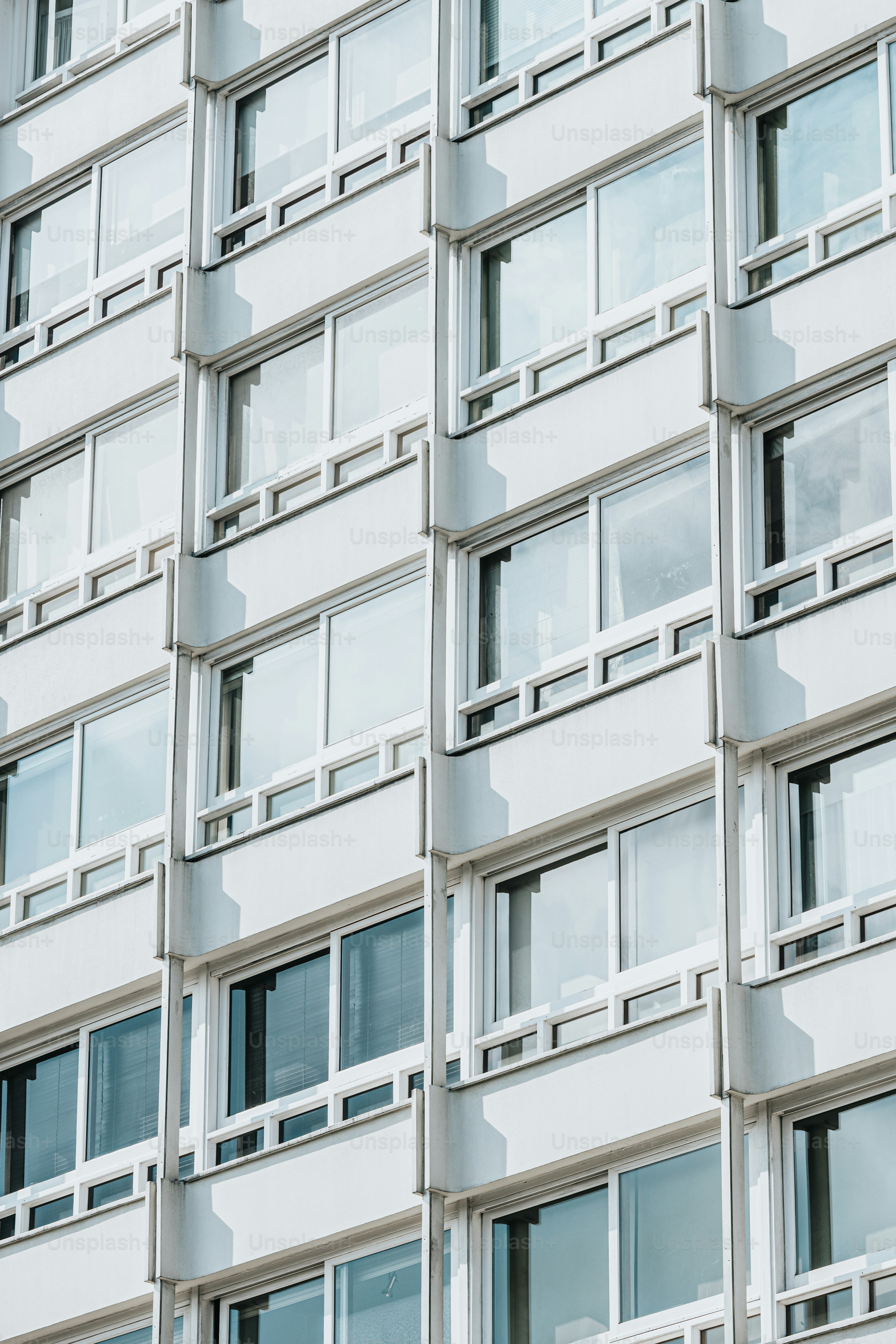 A white window on the side of a white building photo – Screensaver ...