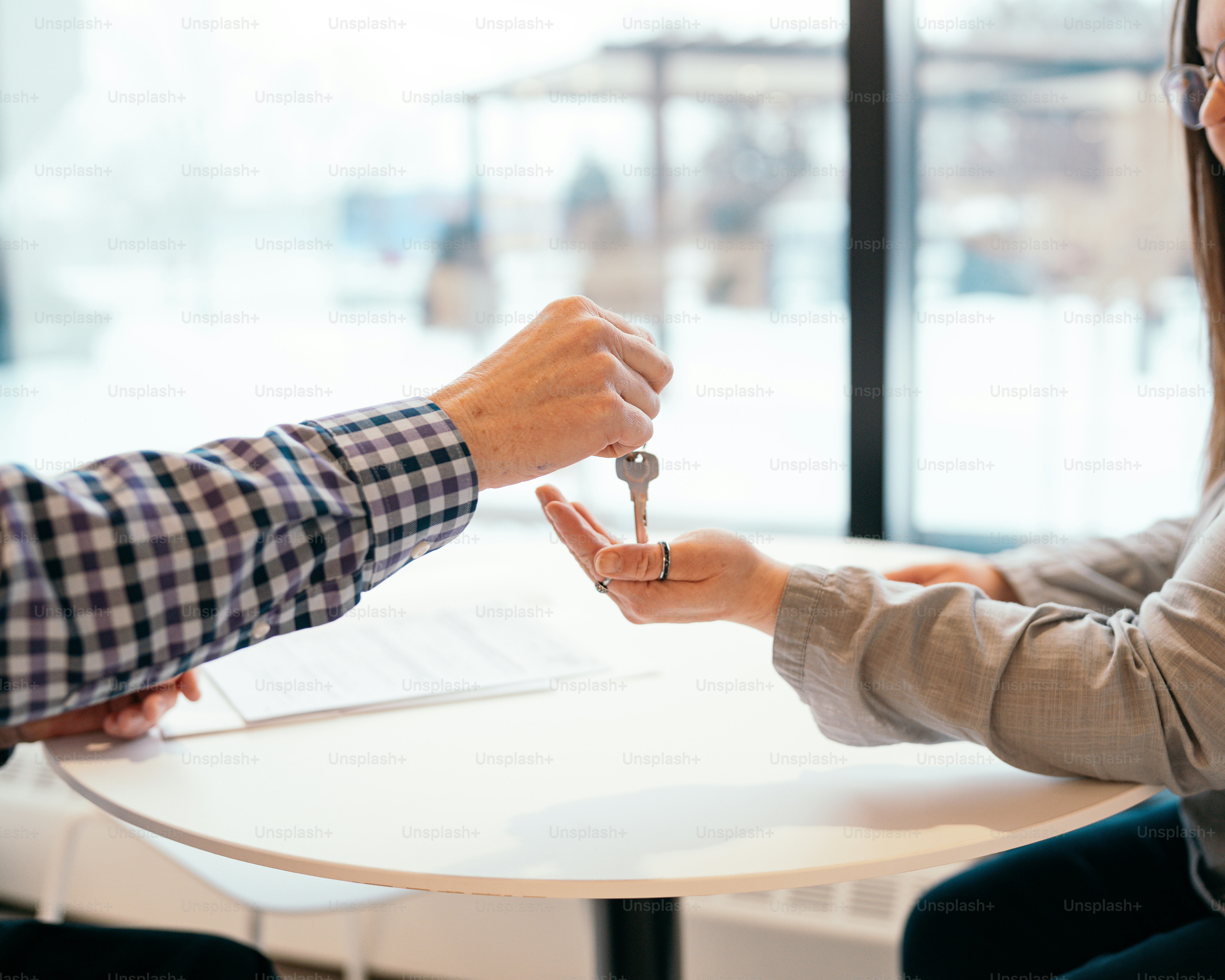 A man handing a woman a car key photo – New house Image on Unsplash