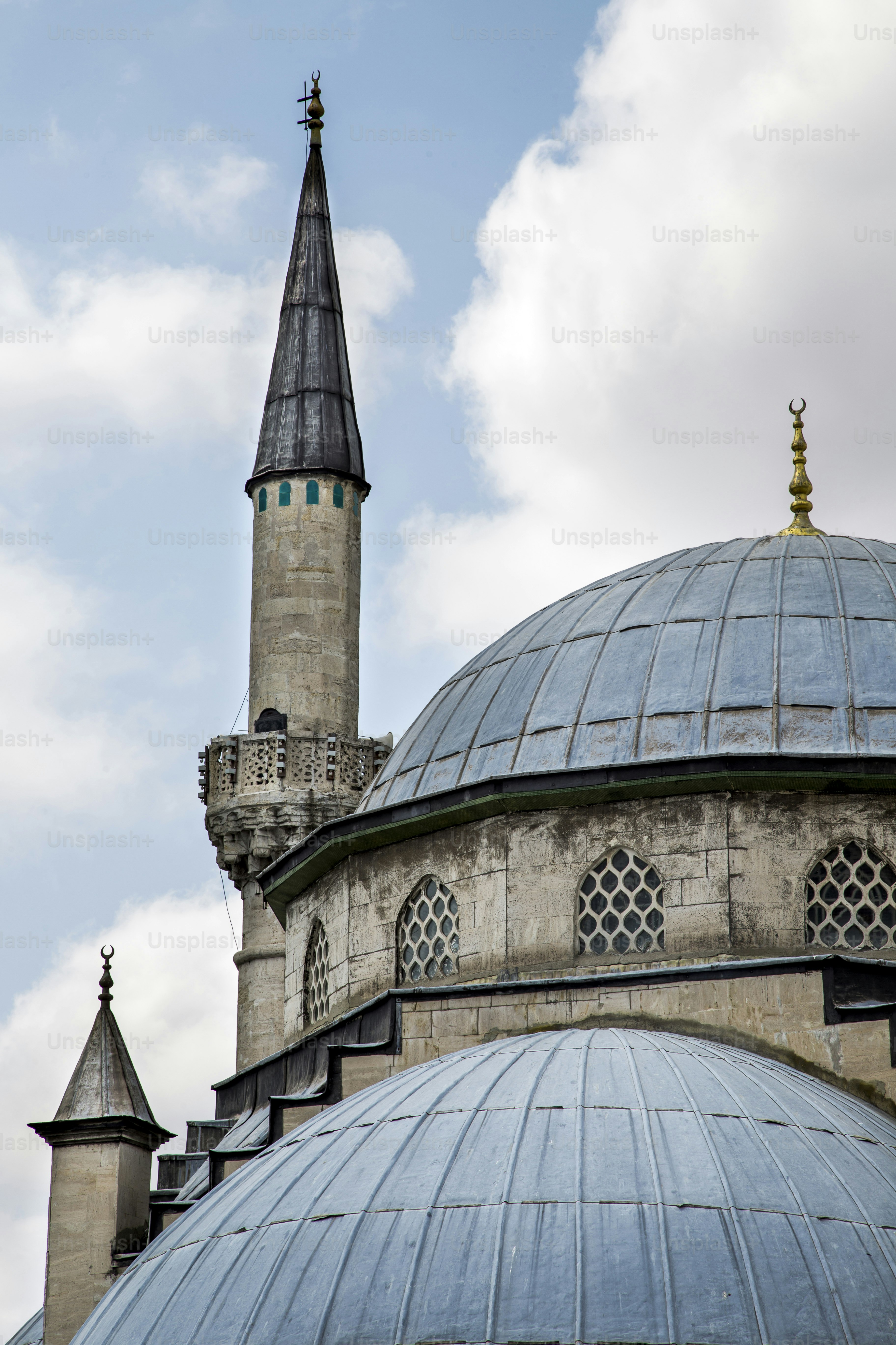 A large building with a blue dome on top of it photo – Tower Image on ...