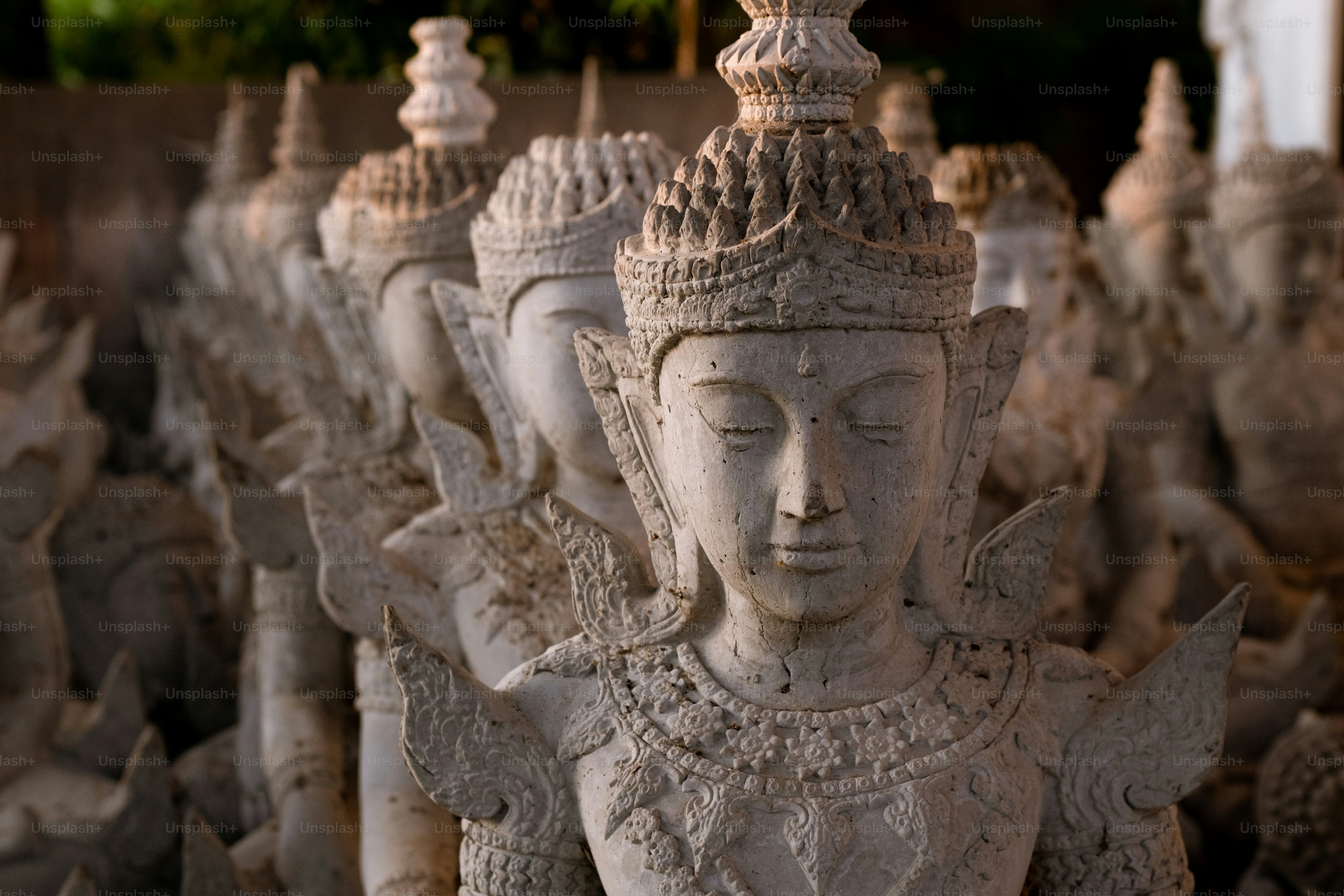 A group of statues of various sizes and shapes photo – Landmark Image ...