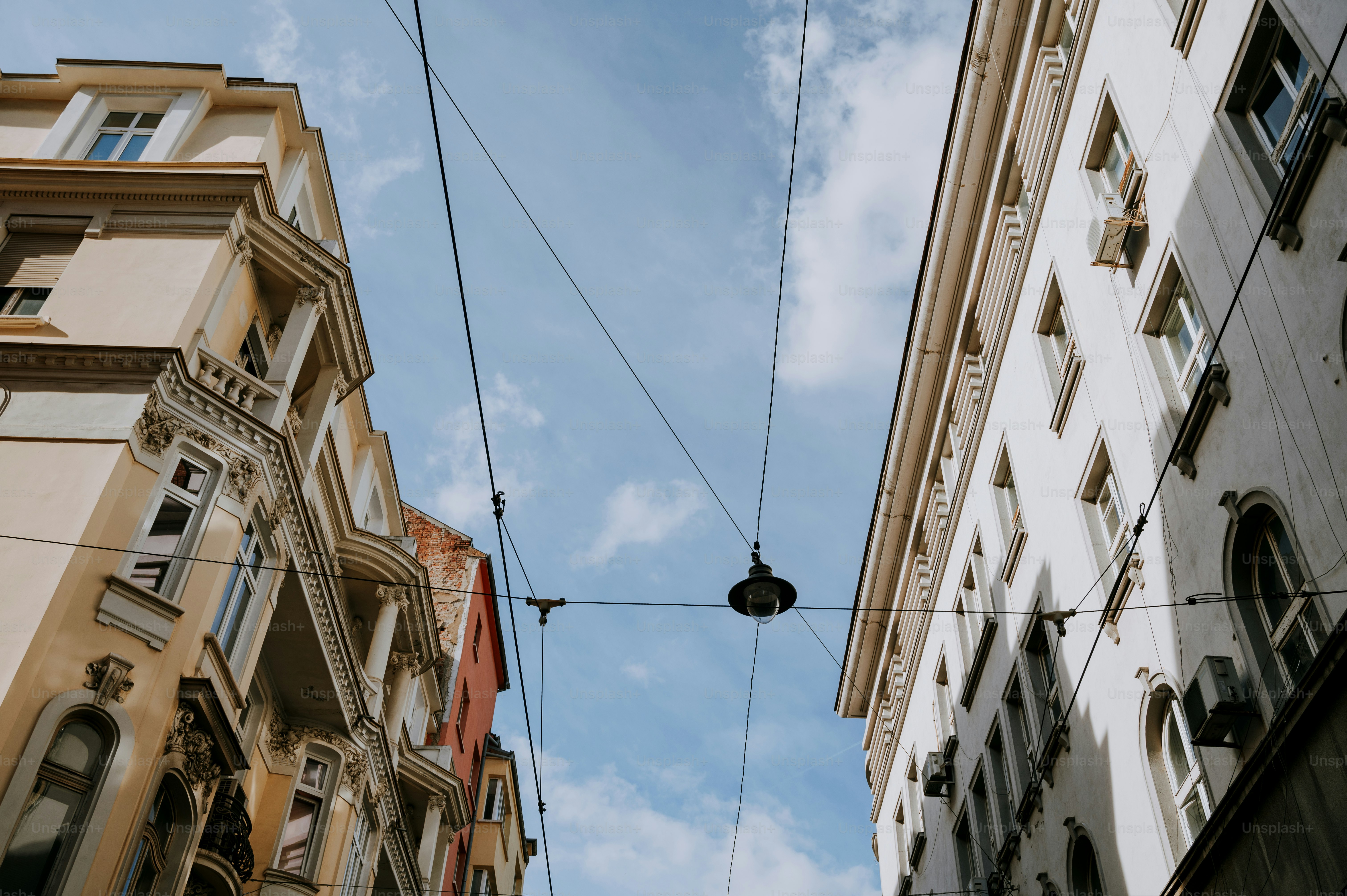 A couple of buildings that are next to each other photo – Building ...