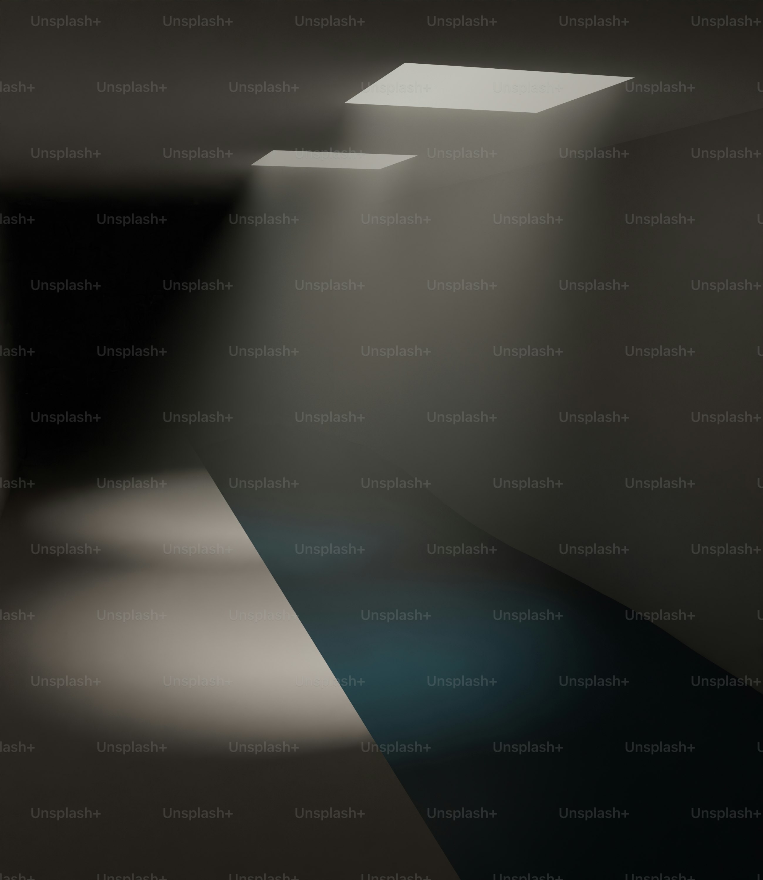 An empty room with a light coming through the window photo – Wallpaper ...