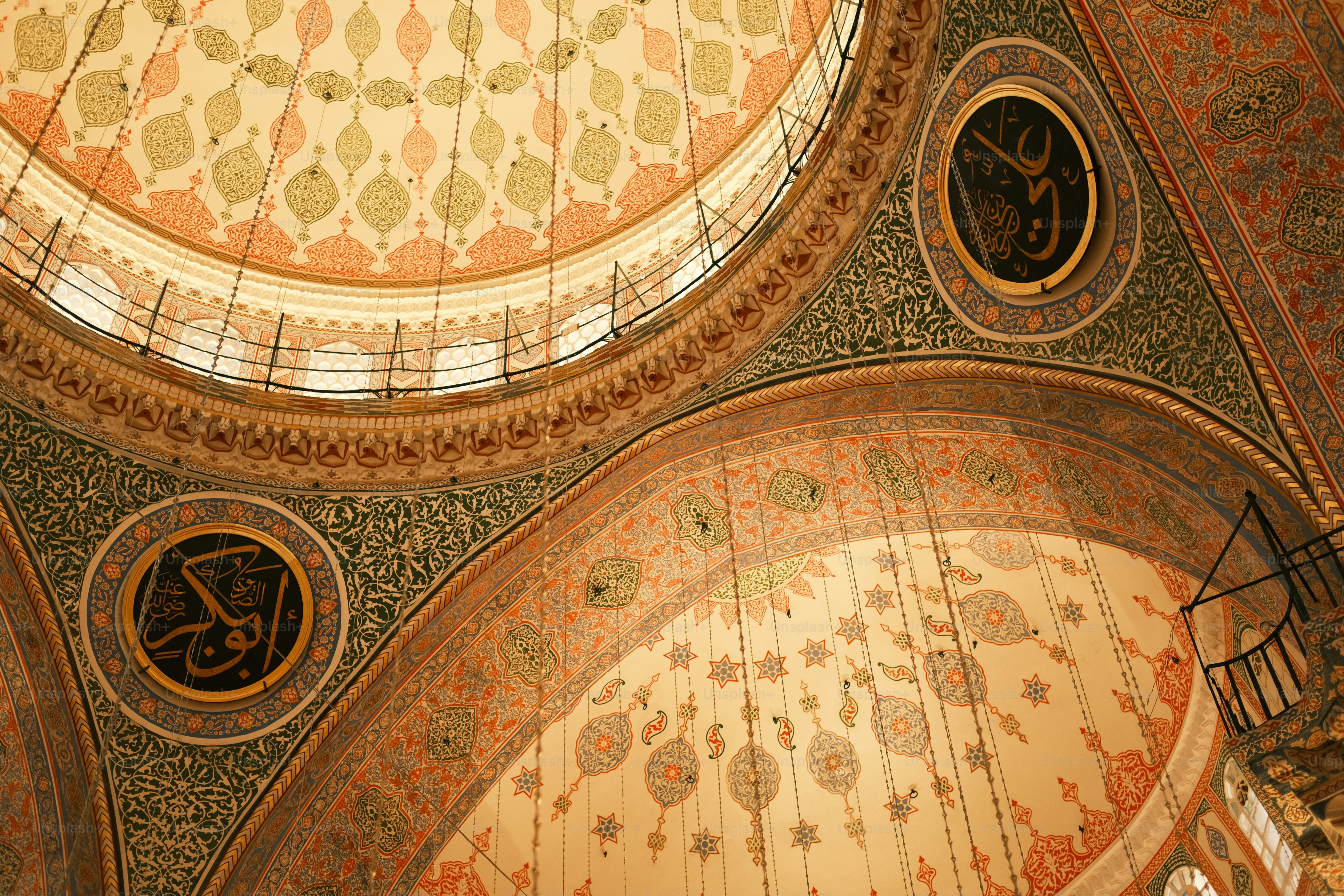 The ceiling of a large building with intricate designs photo – Building ...