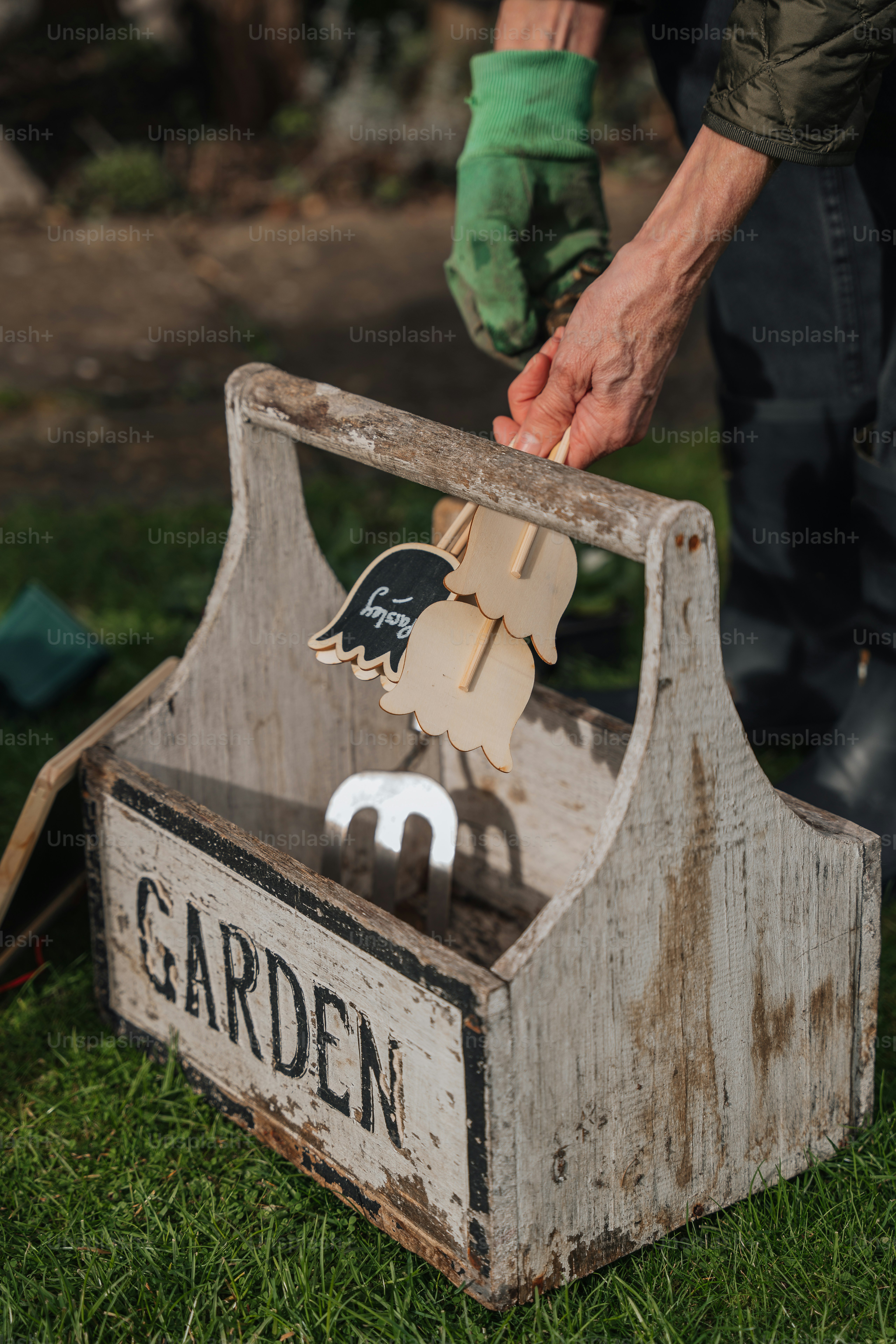 An old wooden garden tool box on the grass photo – Tool box Image on ...