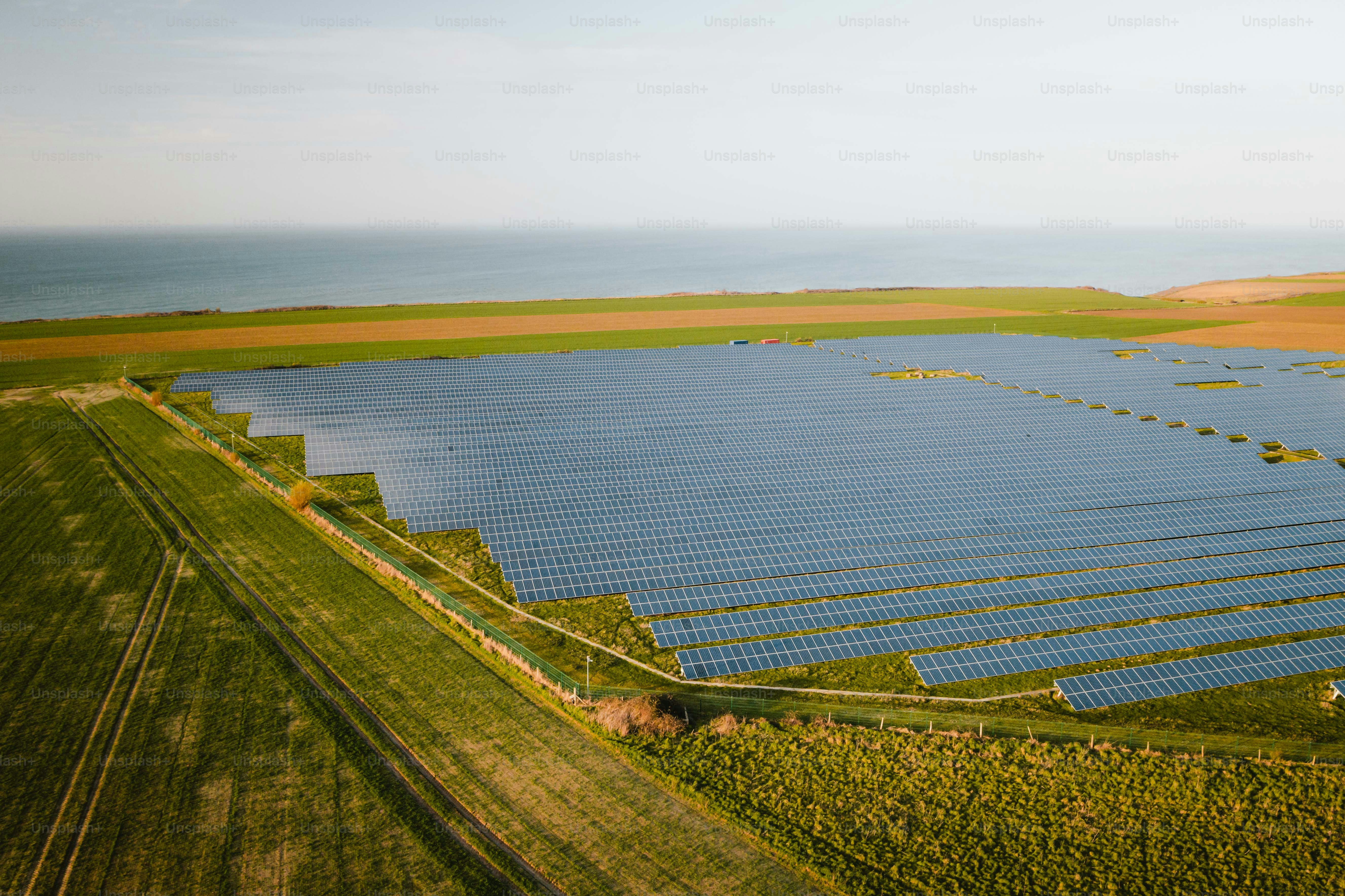 An aerial view of a large solar farm photo – Solar Image on Unsplash