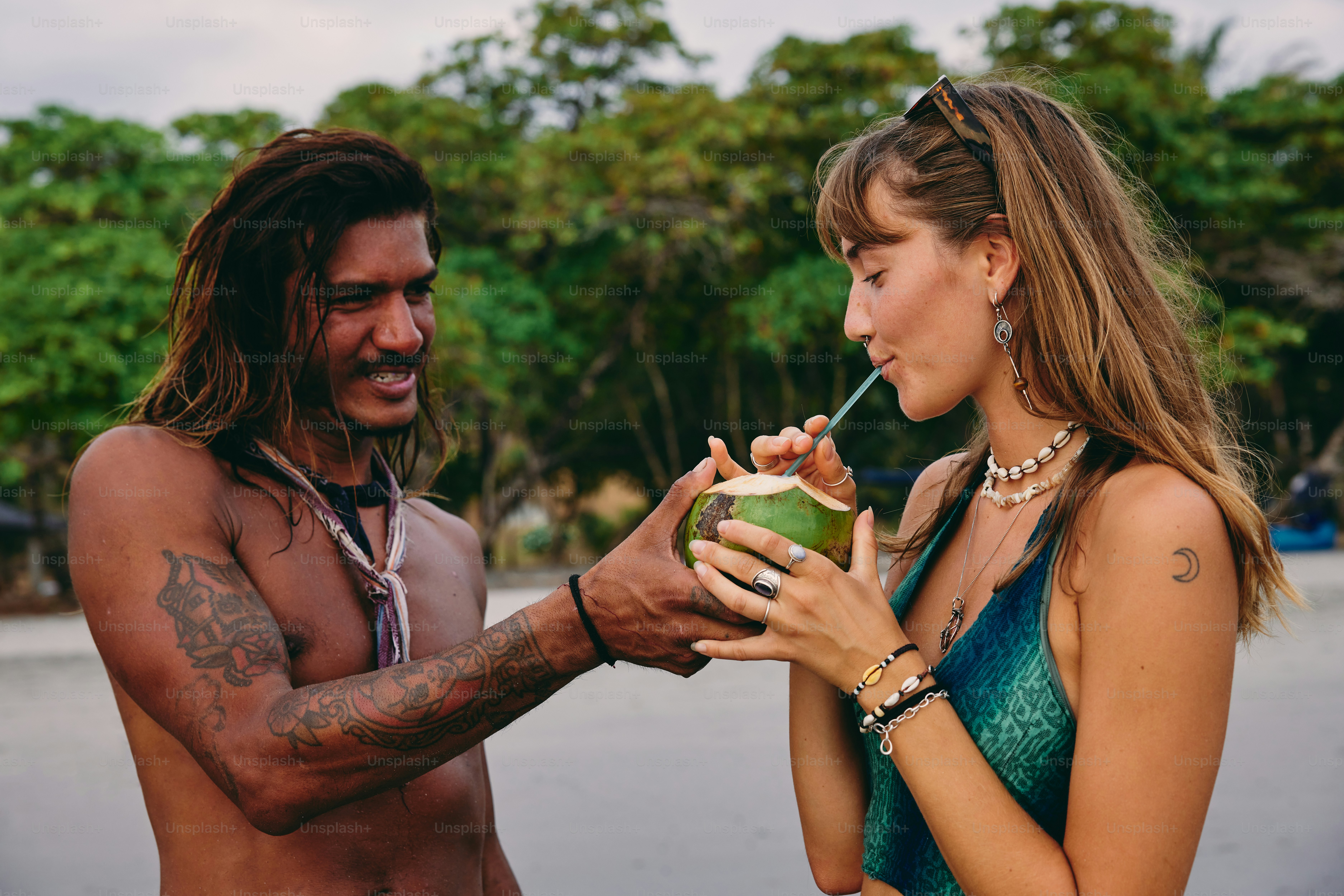 A man and a woman standing next to each other photo – Spring break ...
