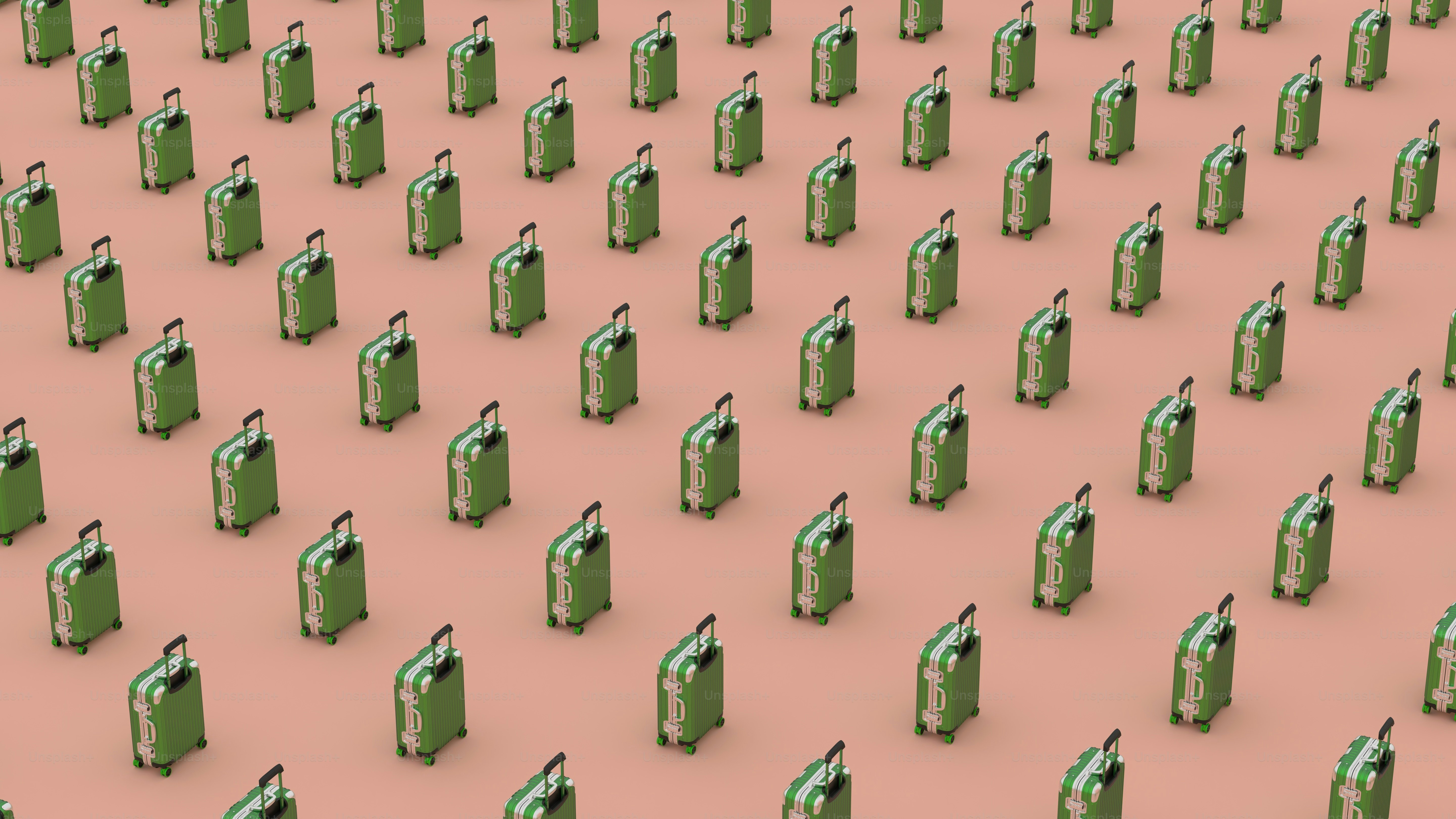 A large group of green objects on a pink surface photo – Luggage Image ...