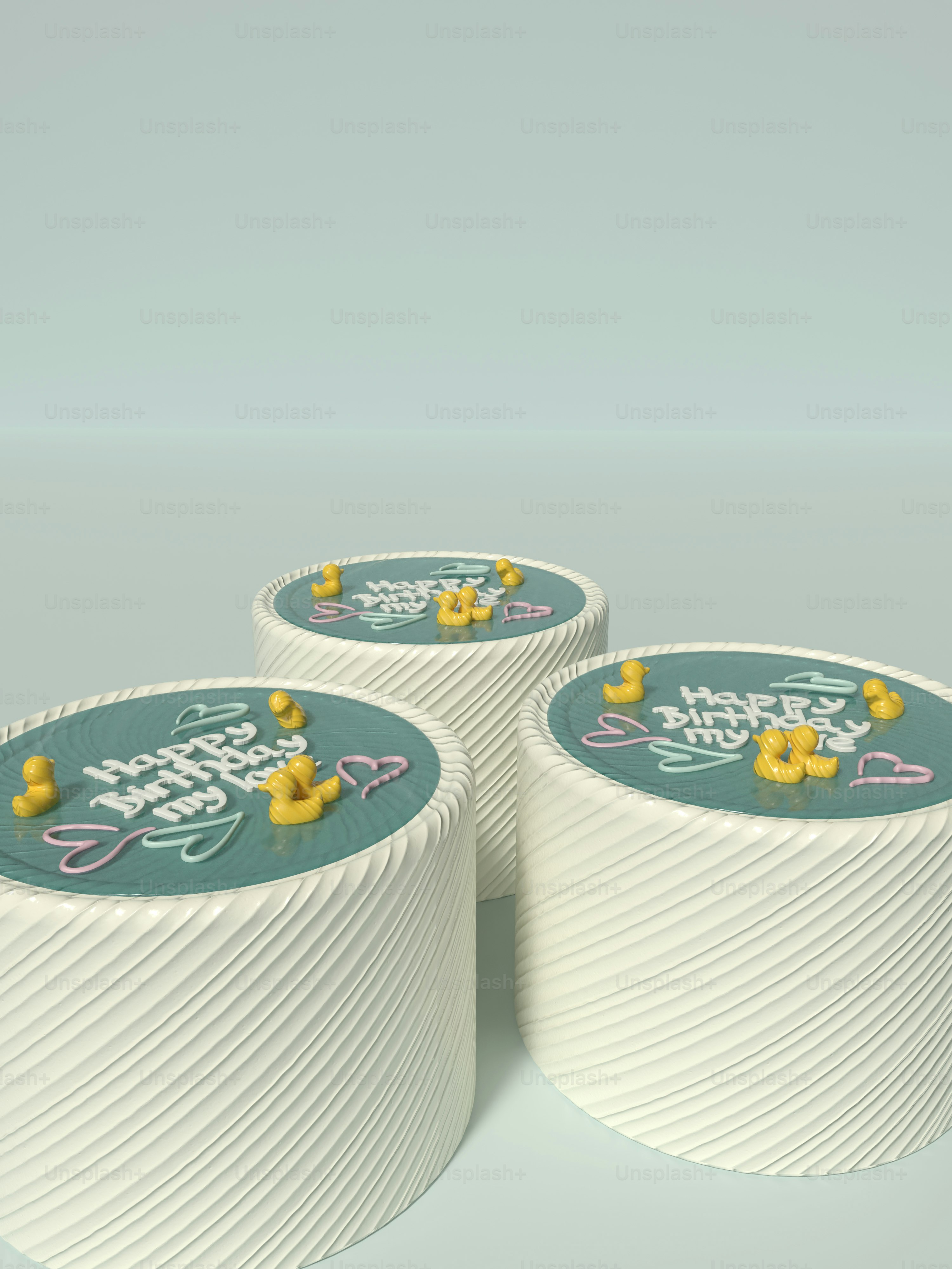 Three rolls of white cake paper on a table photo – Wallpaper Image on ...