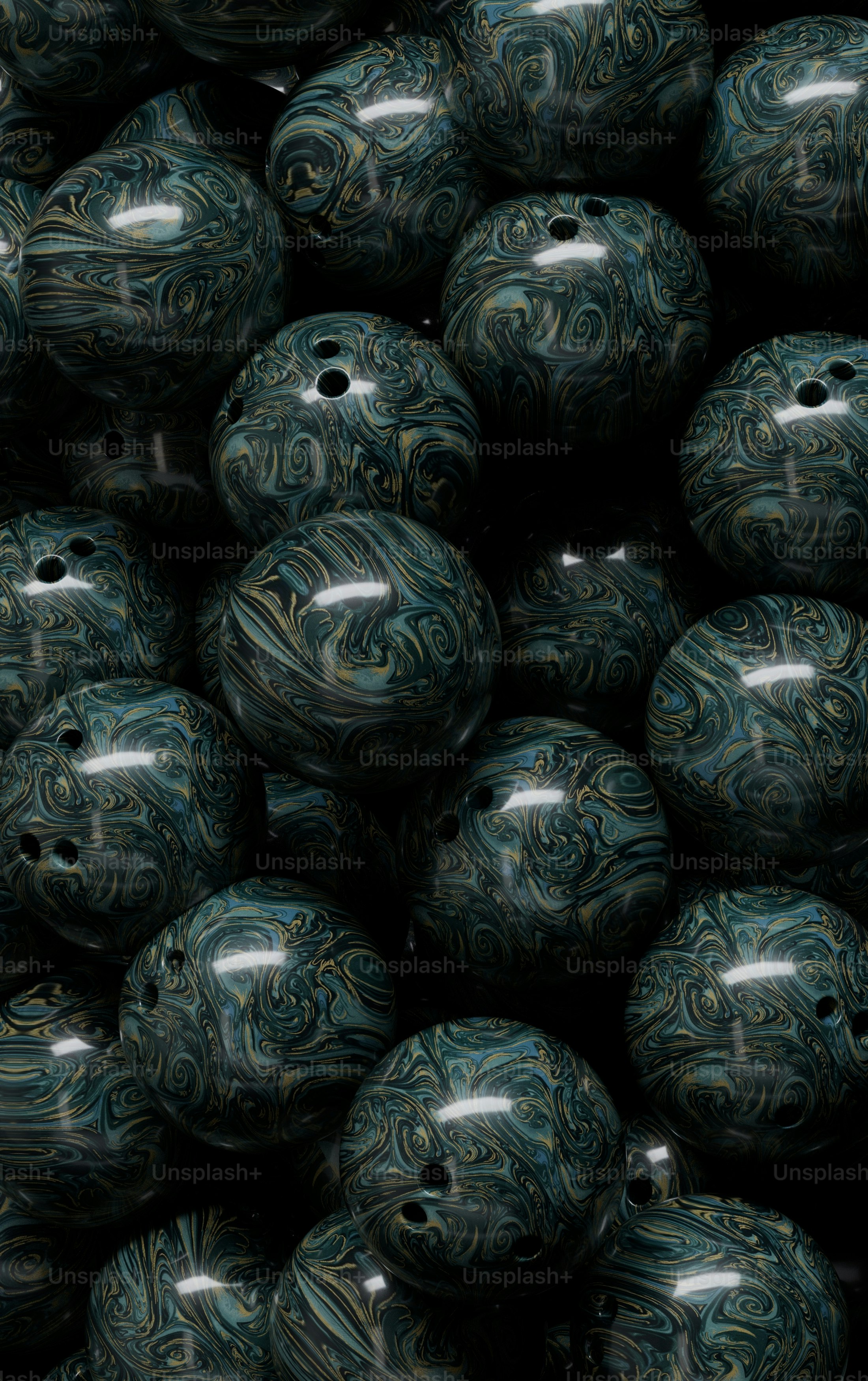 A close up of a bunch of marbled balls photo – Strike Image on Unsplash