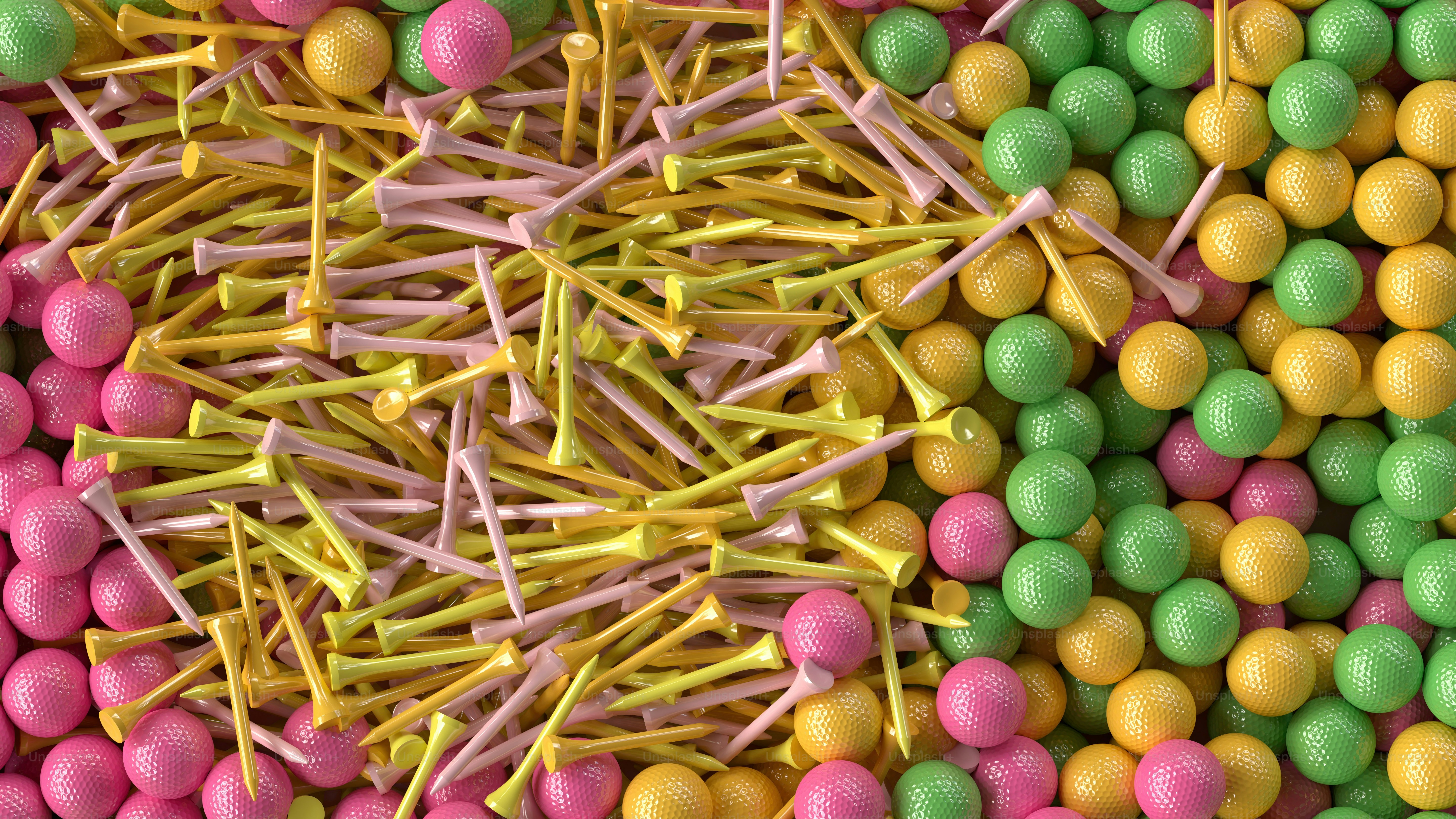 A large pile of colorful candies with yellow, pink, and green candies ...