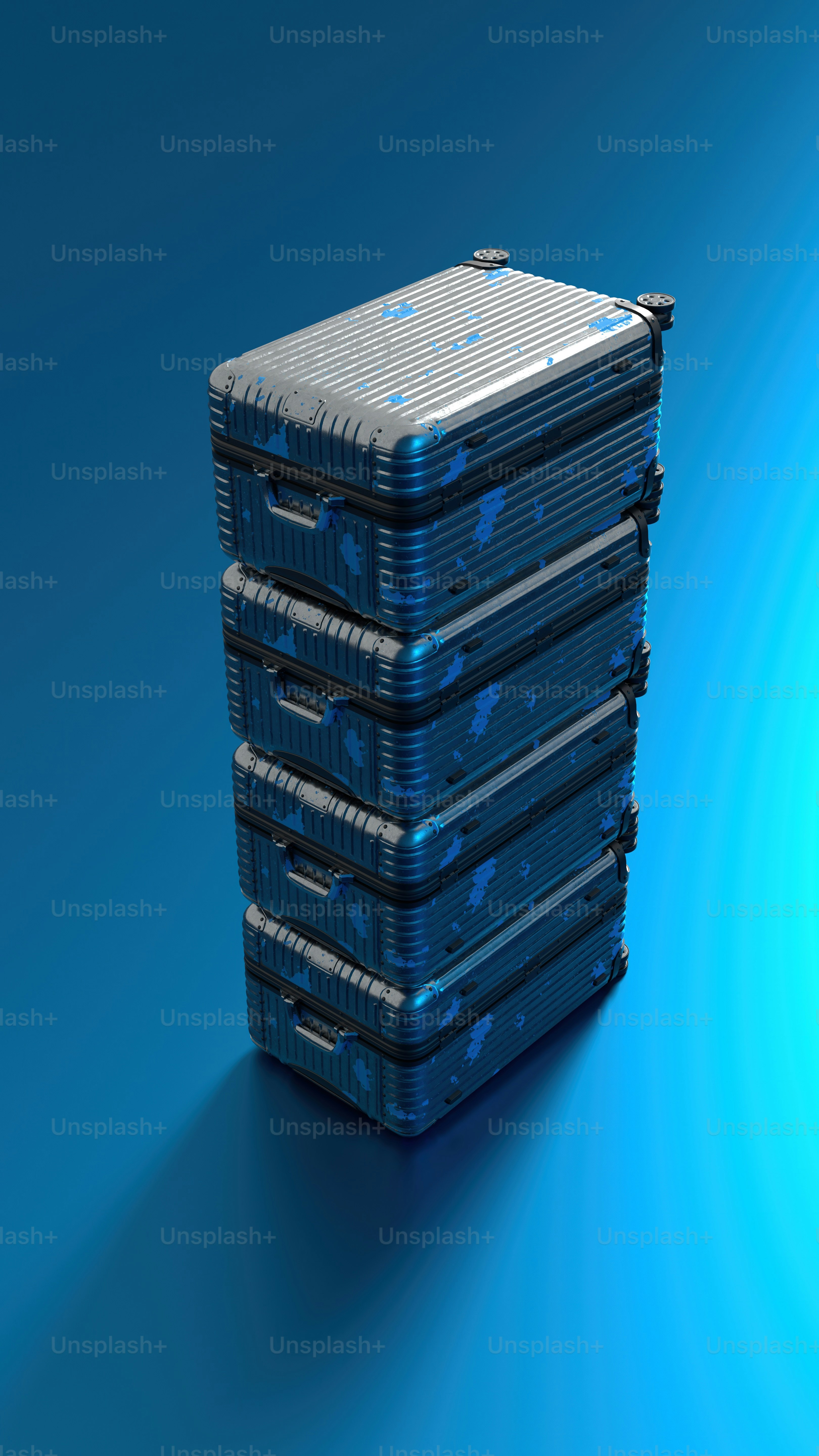 A stack of metal containers sitting on top of a blue floor photo ...