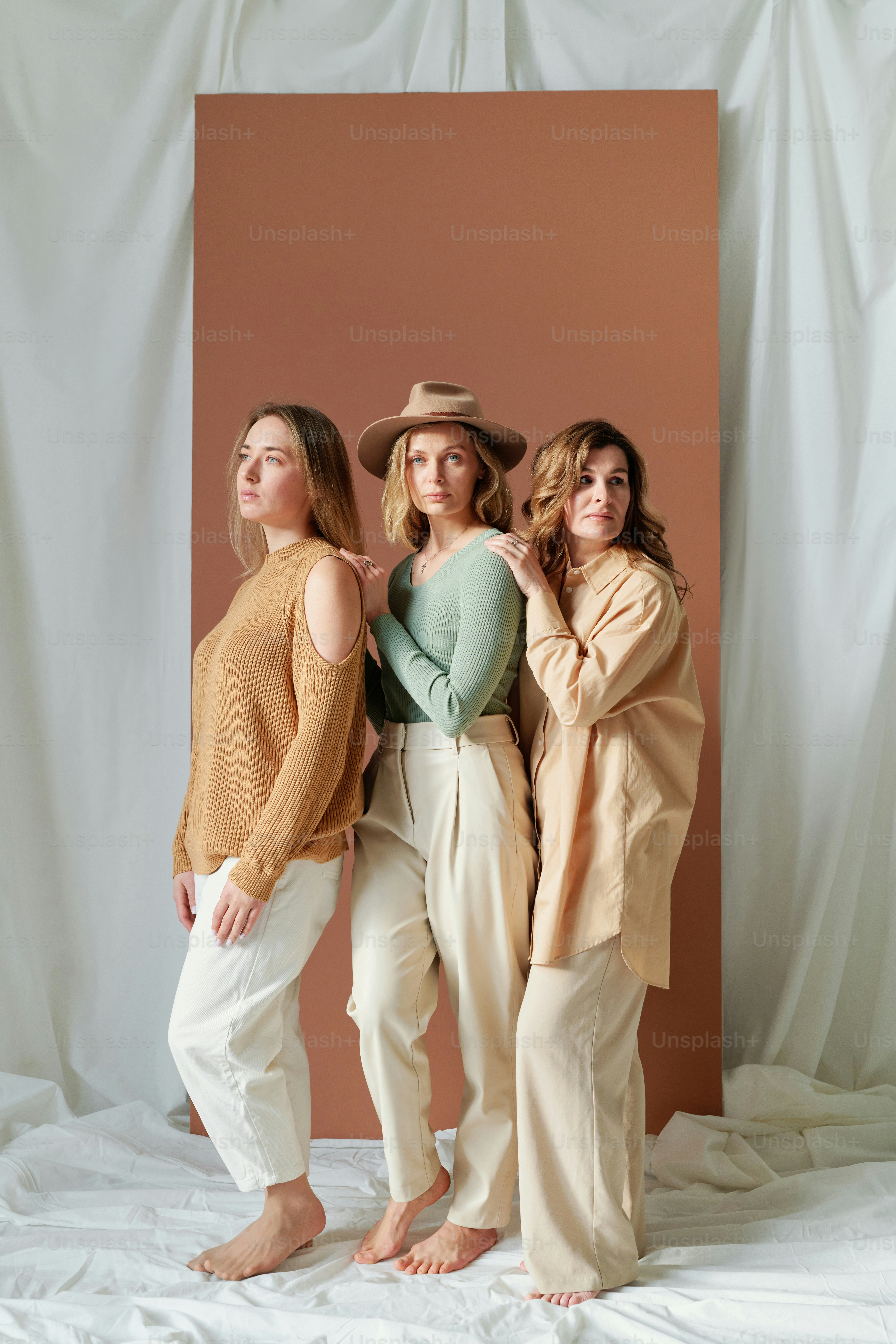 A group of three women standing next to each other photo – Sisterhood ...