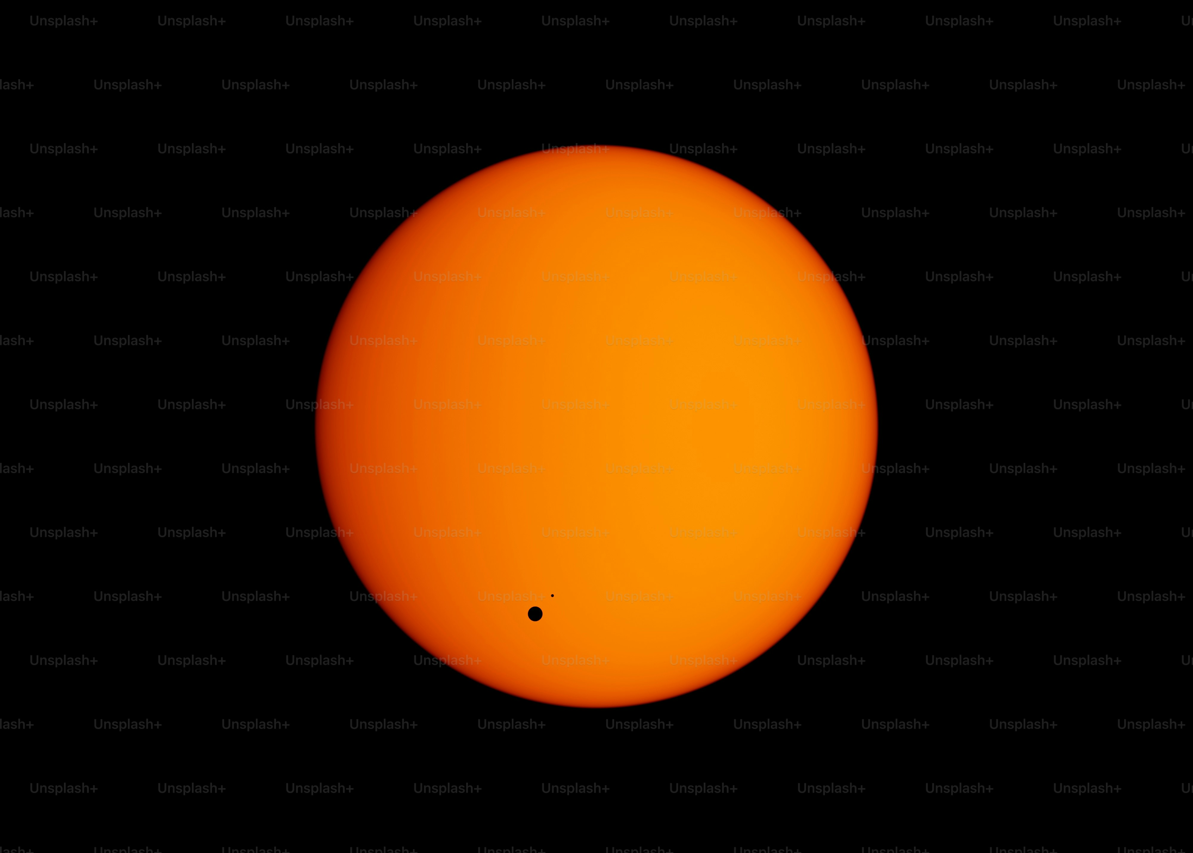 A bright orange ball of sun in the dark sky photo – Sun in space Image ...