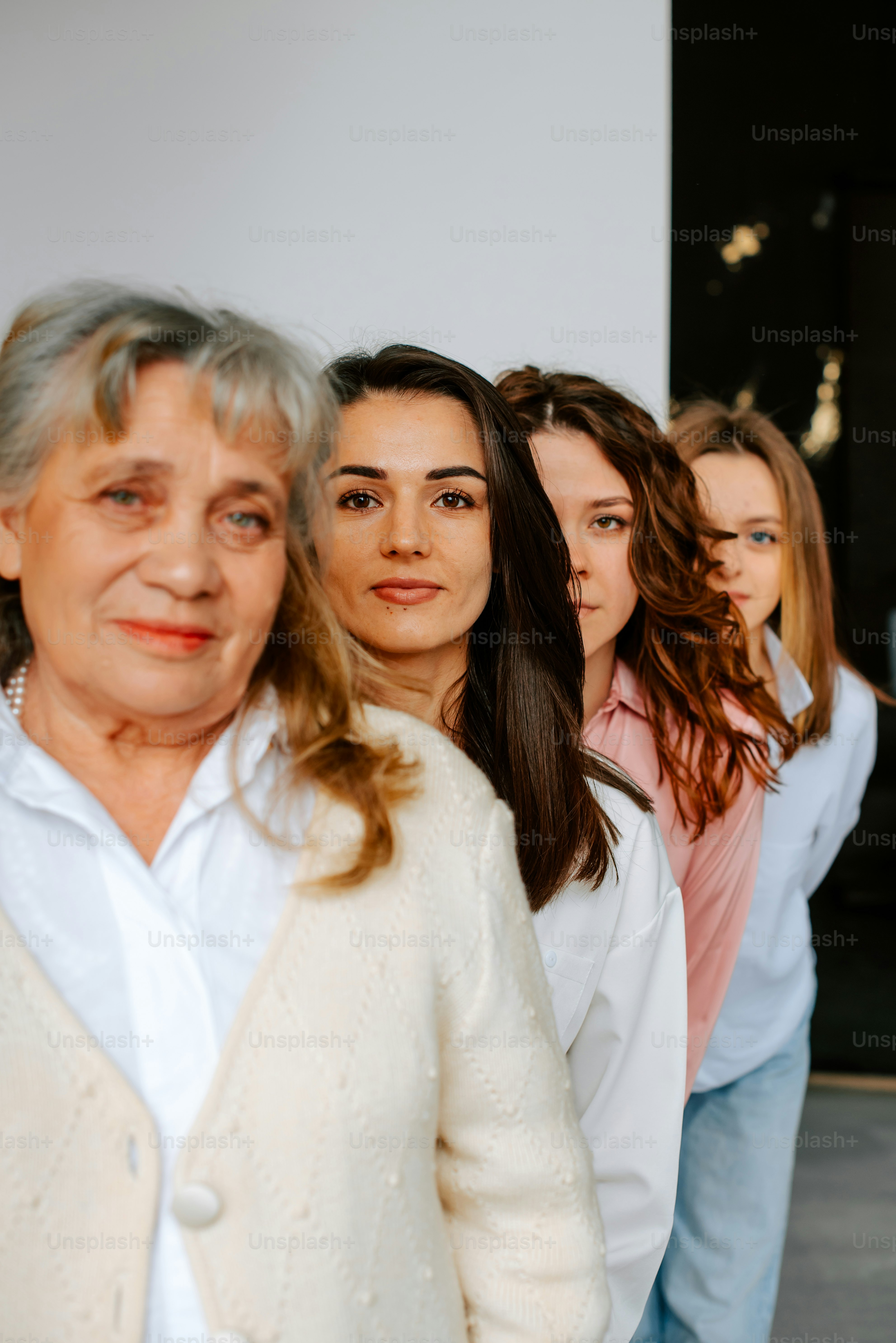 A group of women standing next to each other photo – Multi generational ...
