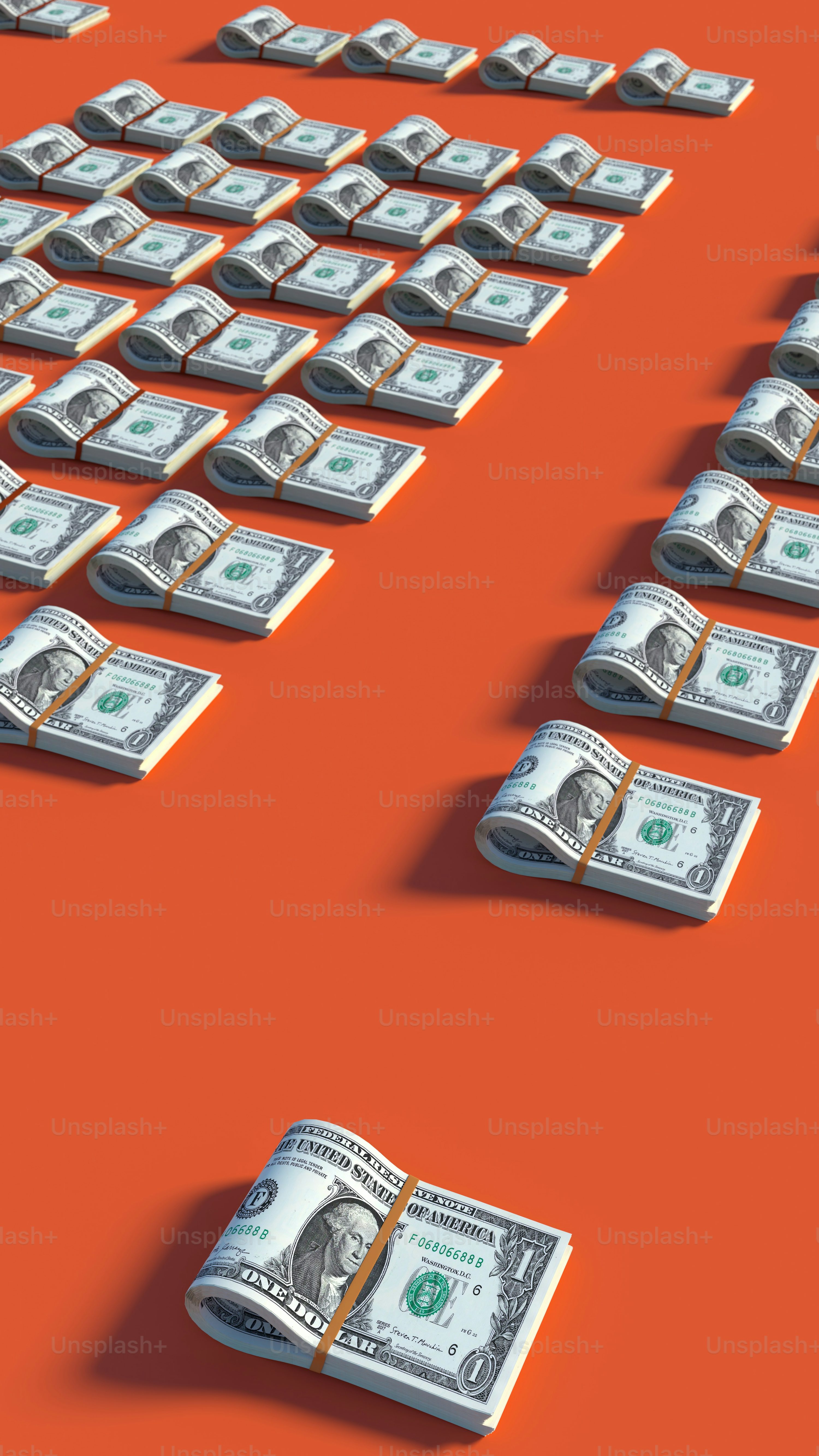 A bunch of money sitting on top of a table photo – Background Image on ... A bunch of money sitting on top of a table photo – Background Image on ...