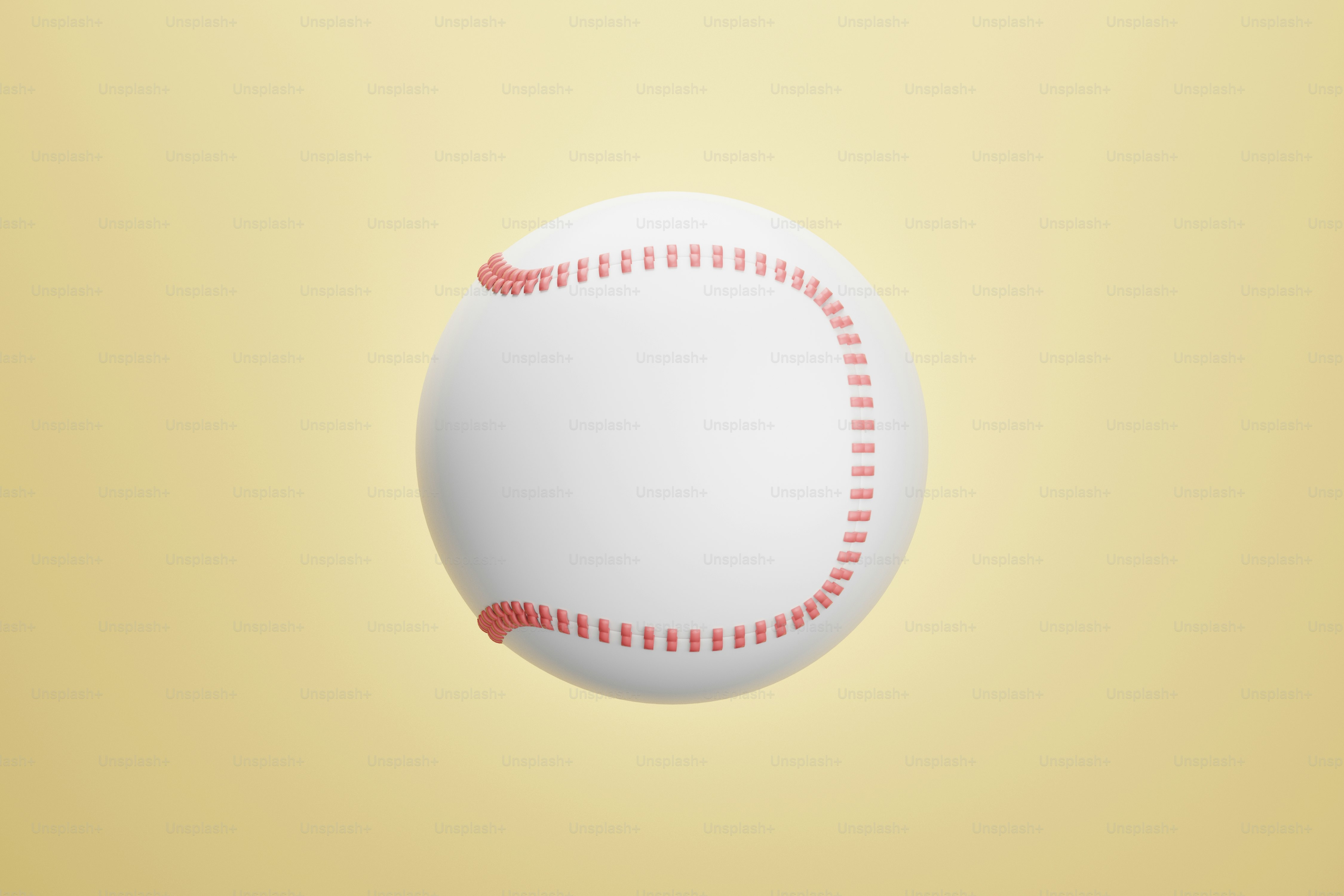 A baseball is flying through the air on a yellow background photo ...