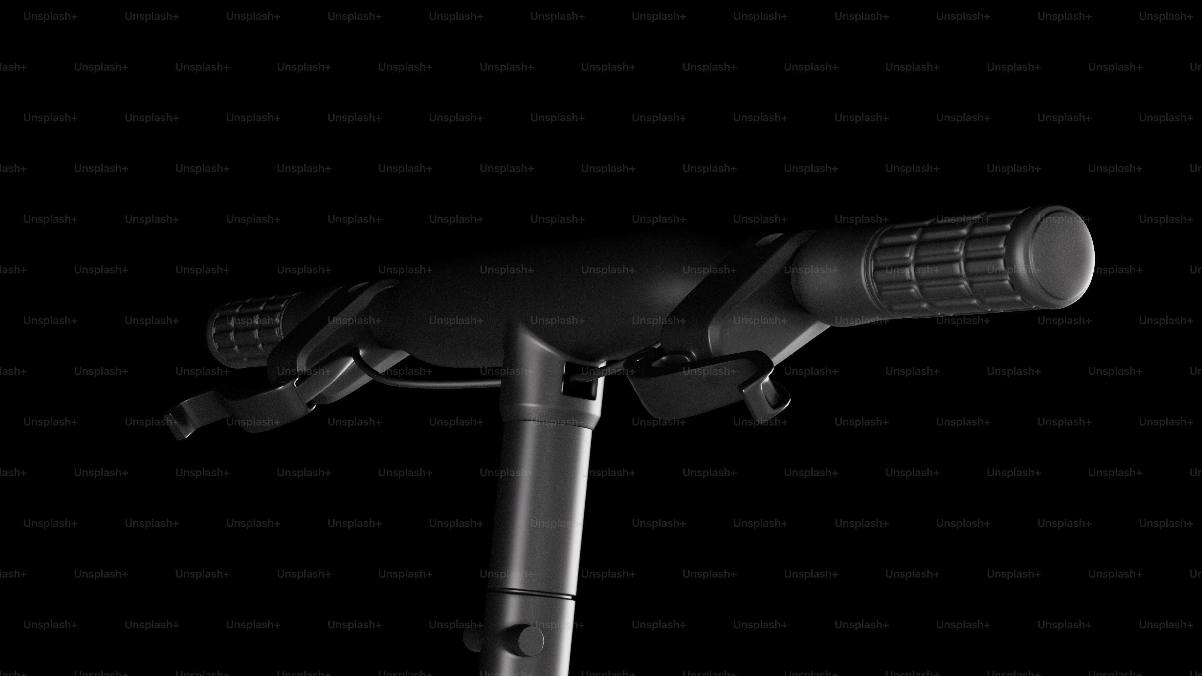 A close up of a bike handlebar with a black background photo ...