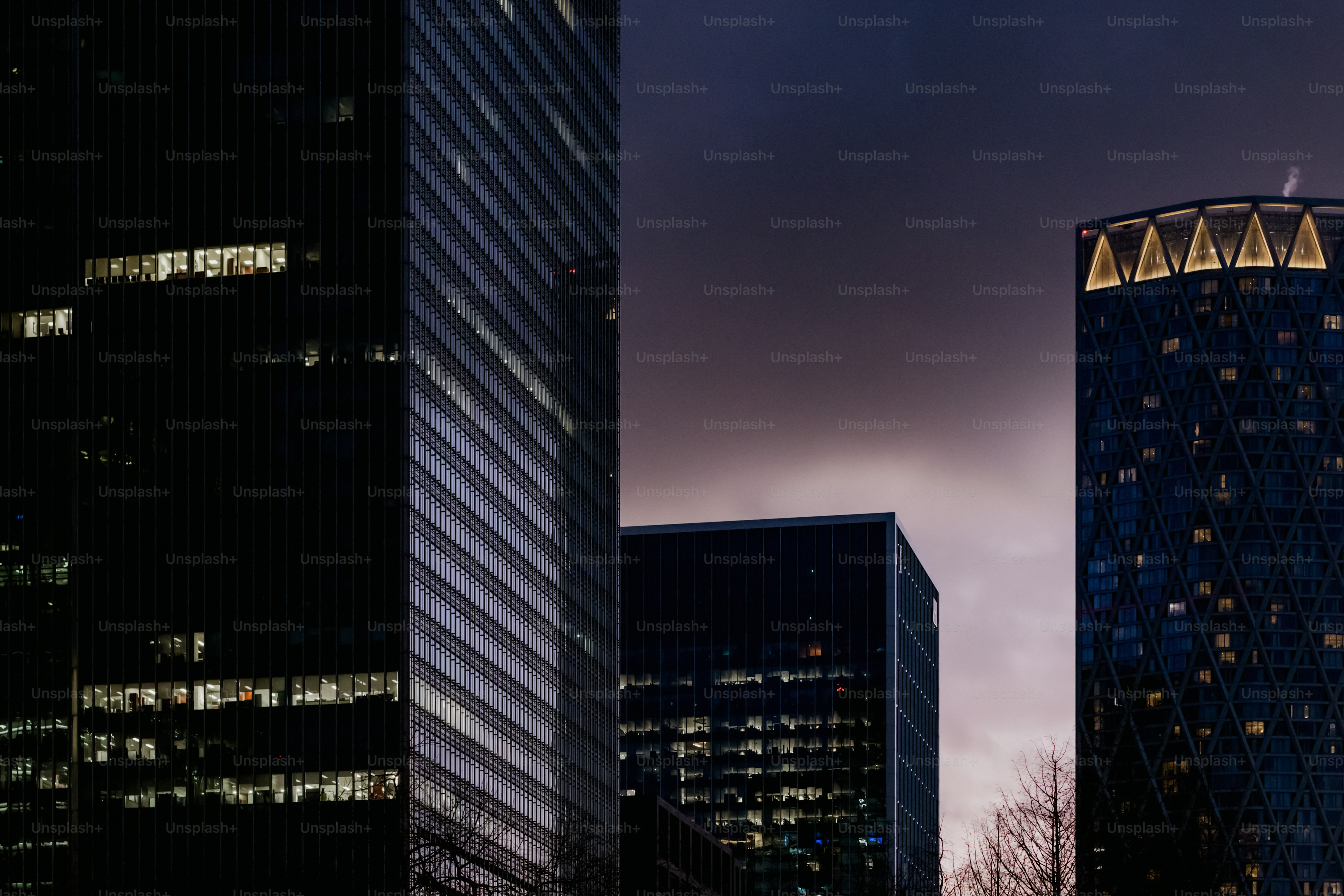 A group of tall buildings next to each other photo – London Image on ...