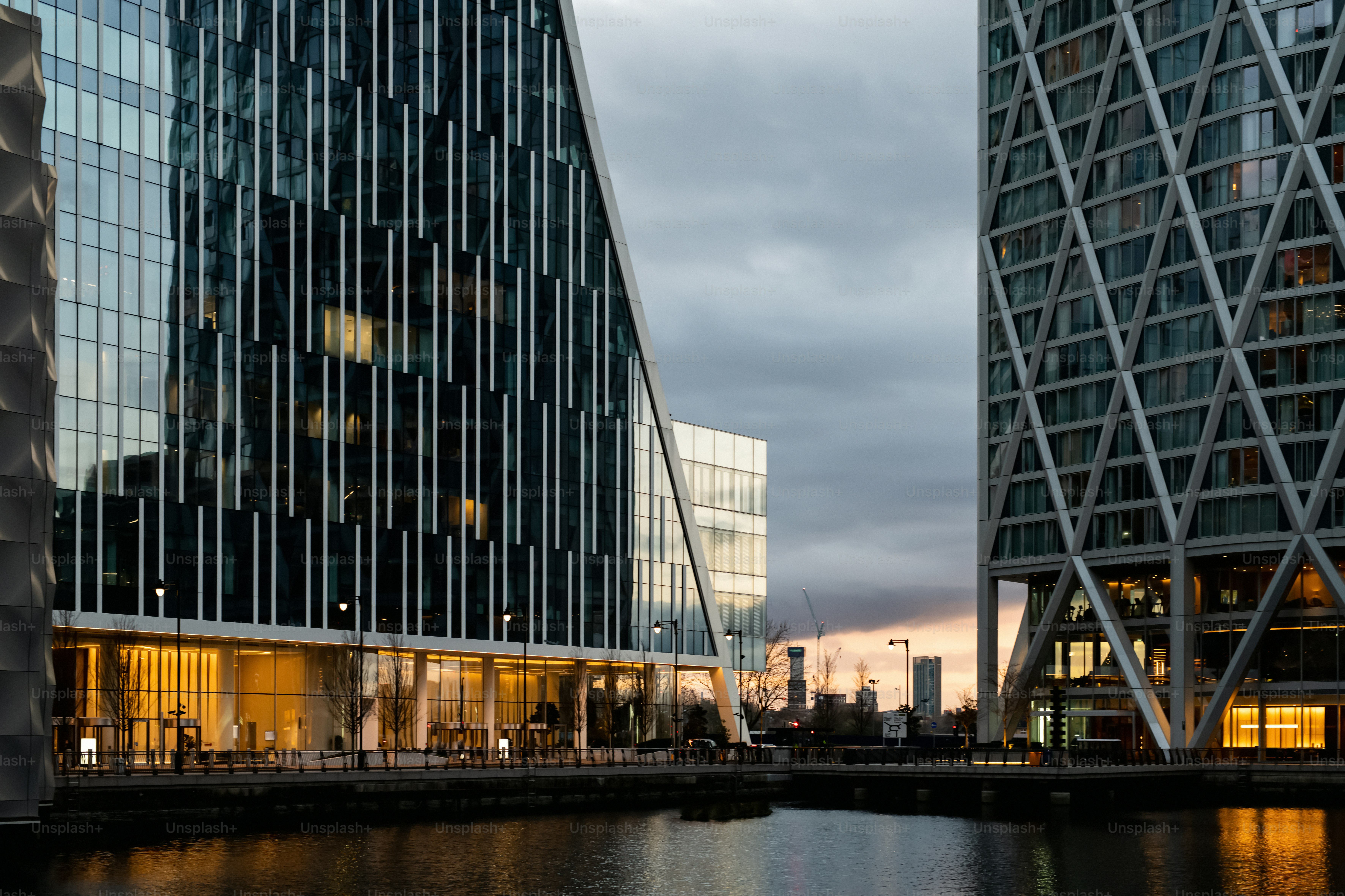 A group of tall buildings sitting next to each other photo – London ...