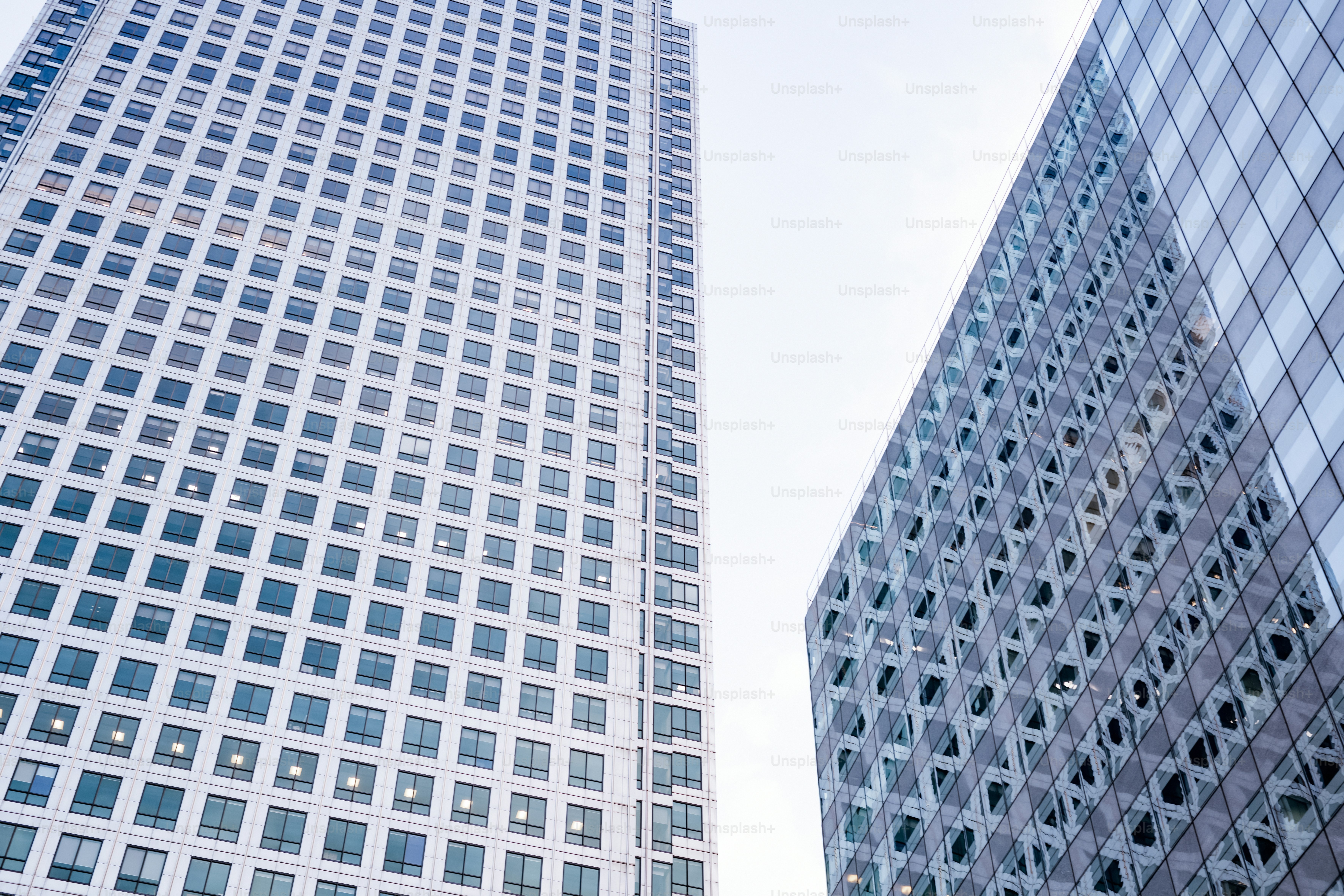A group of tall buildings next to each other photo – London Image on ...