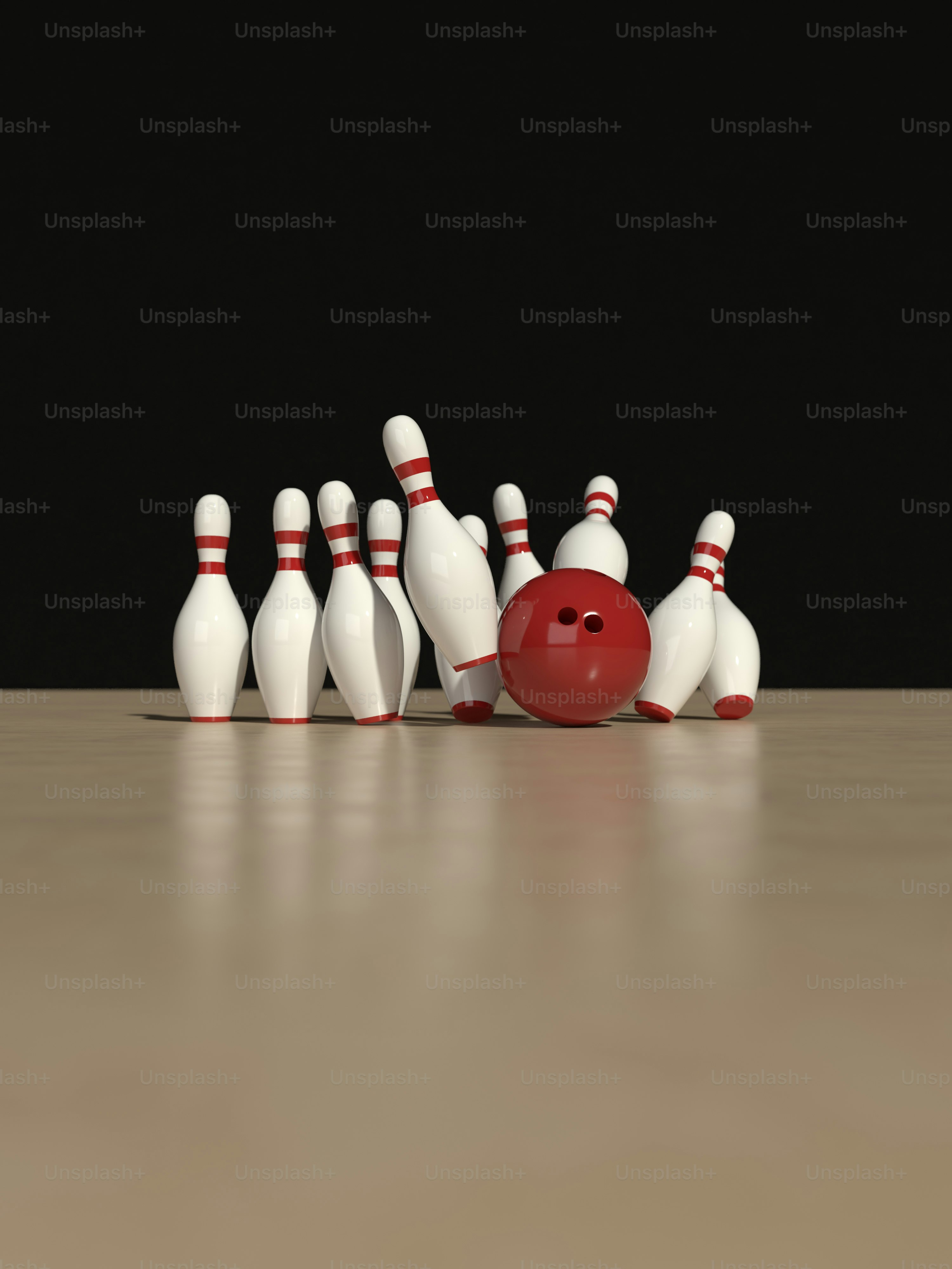 A group of white and red bowling pins and a red ball photo – Bowling ...