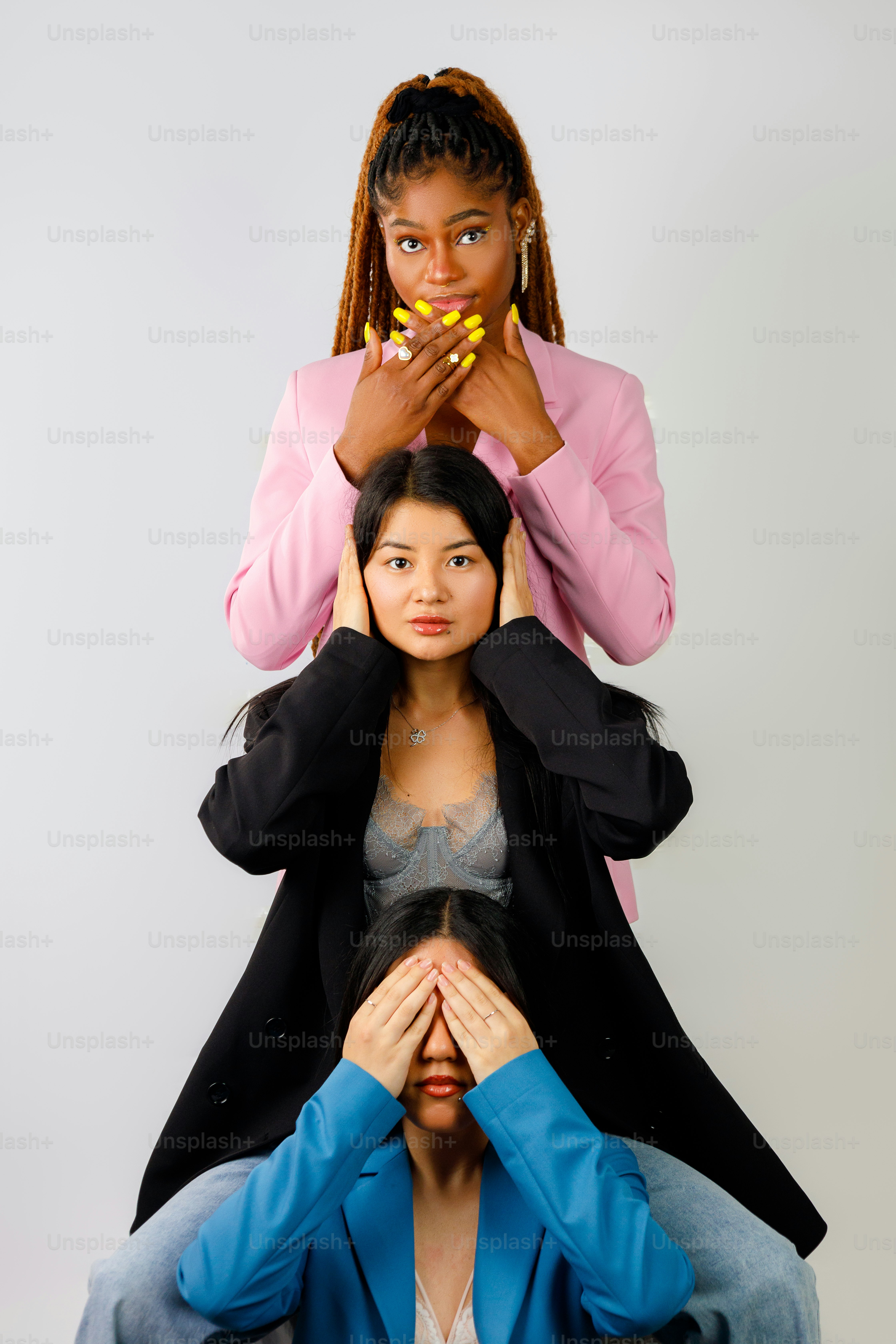 A woman sitting on top of a man's head photo – Model Image on Unsplash