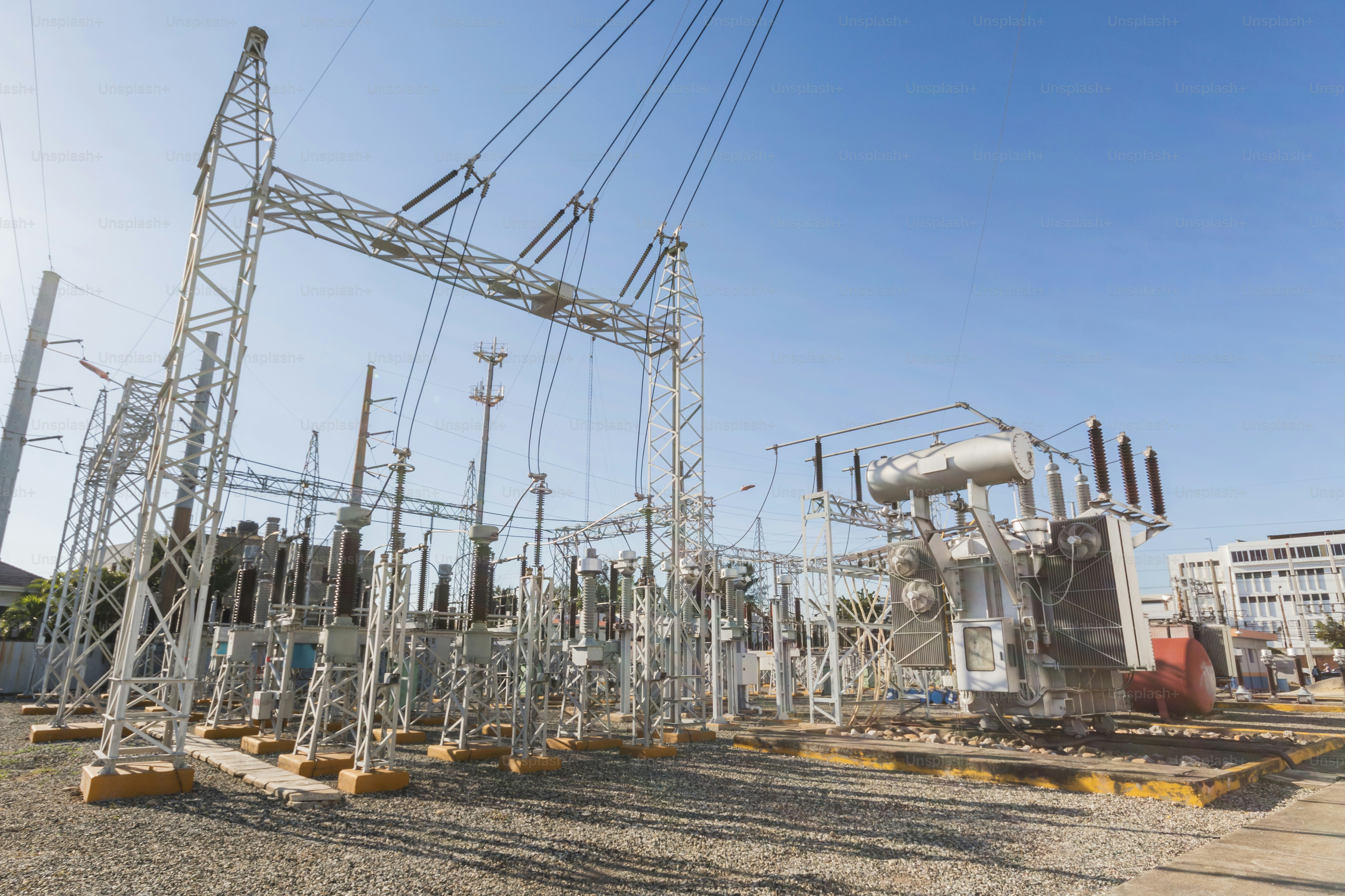 A bunch of power lines sitting next to each other photo – Renewable ...