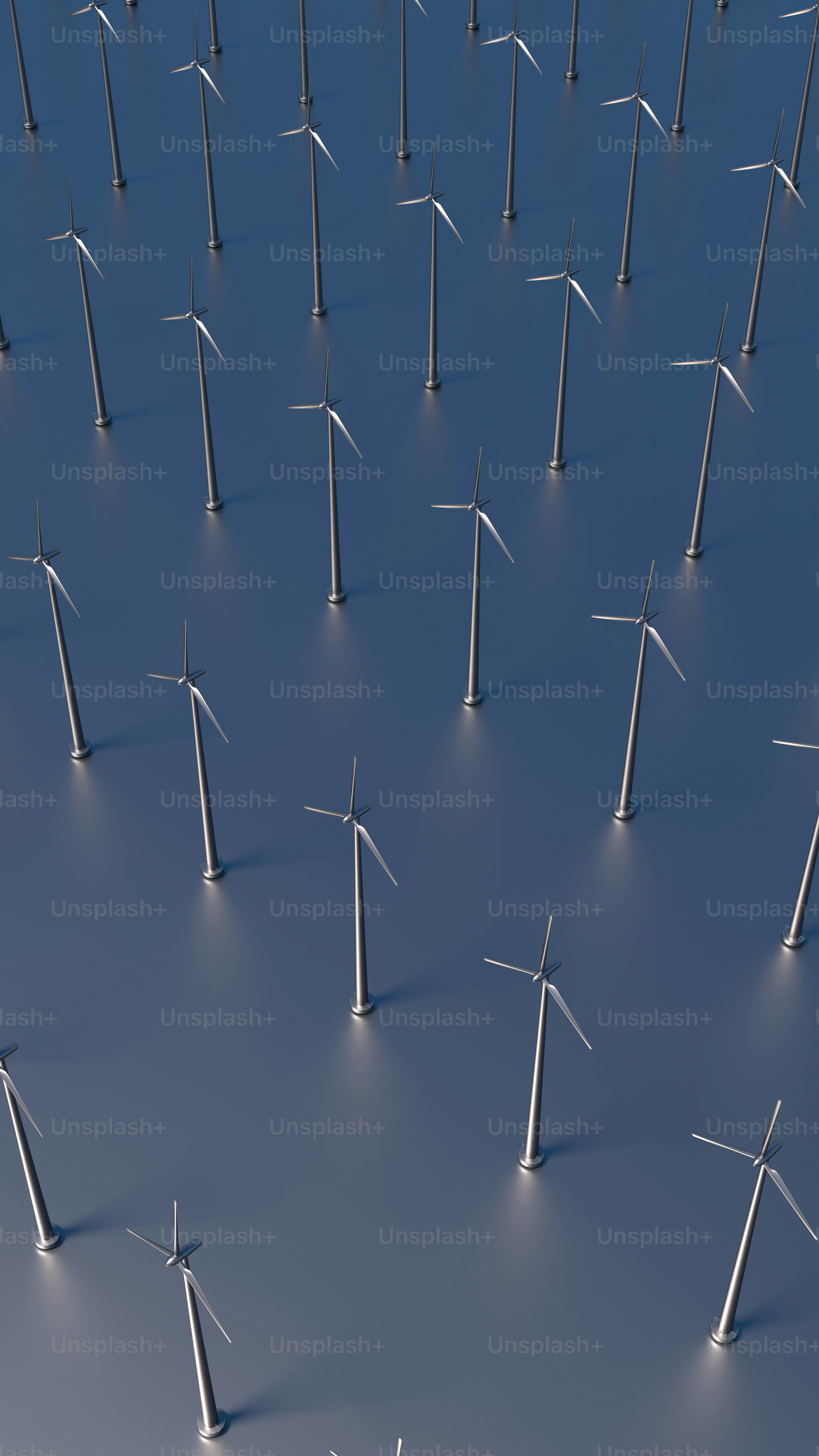 A large group of windmills in the middle of a field photo – Abstract ...