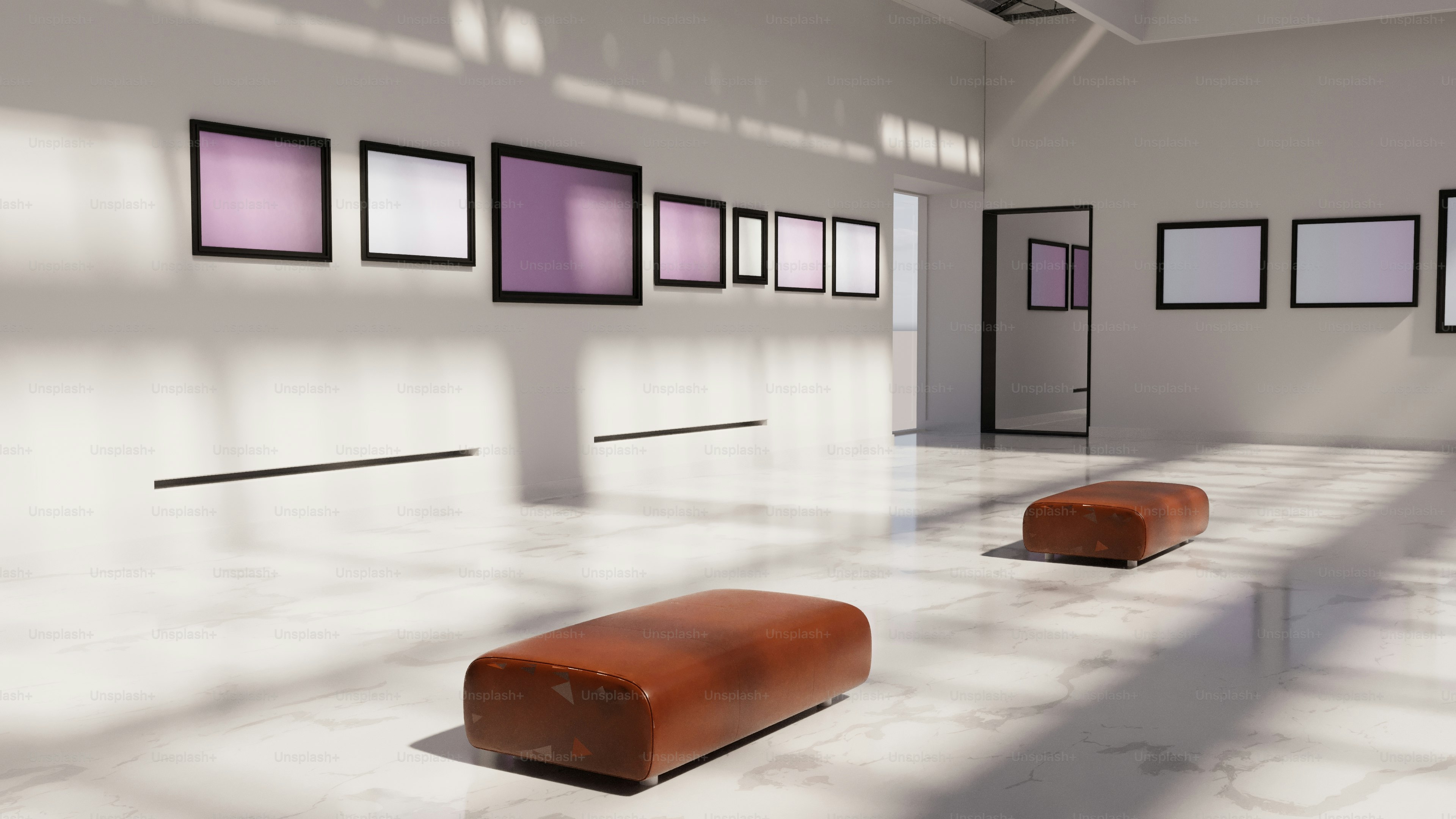 A room with a lot of frames on the wall photo – Art gallery Image on ...