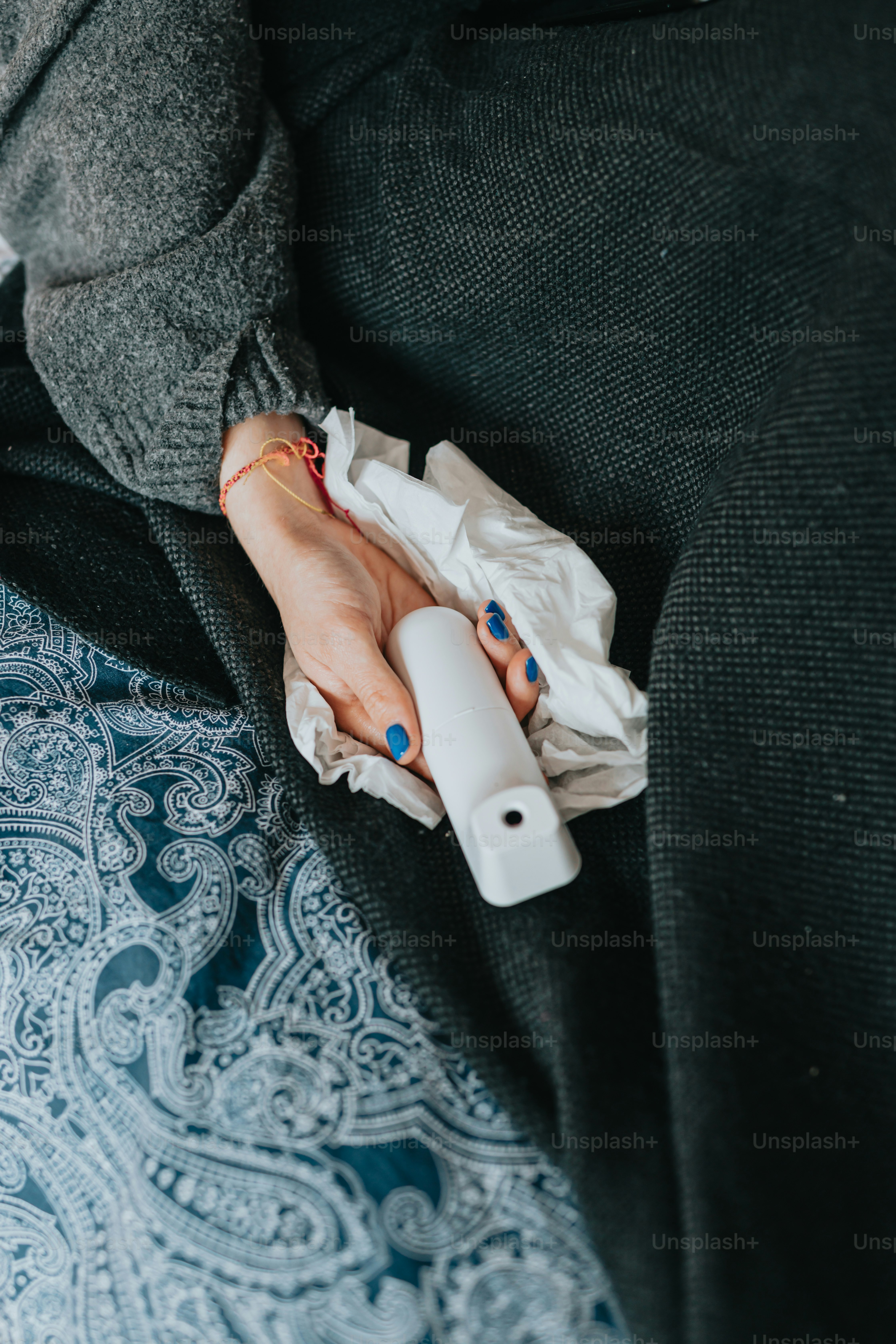 A woman's hands holding a remote control photo – Infection Image on ...