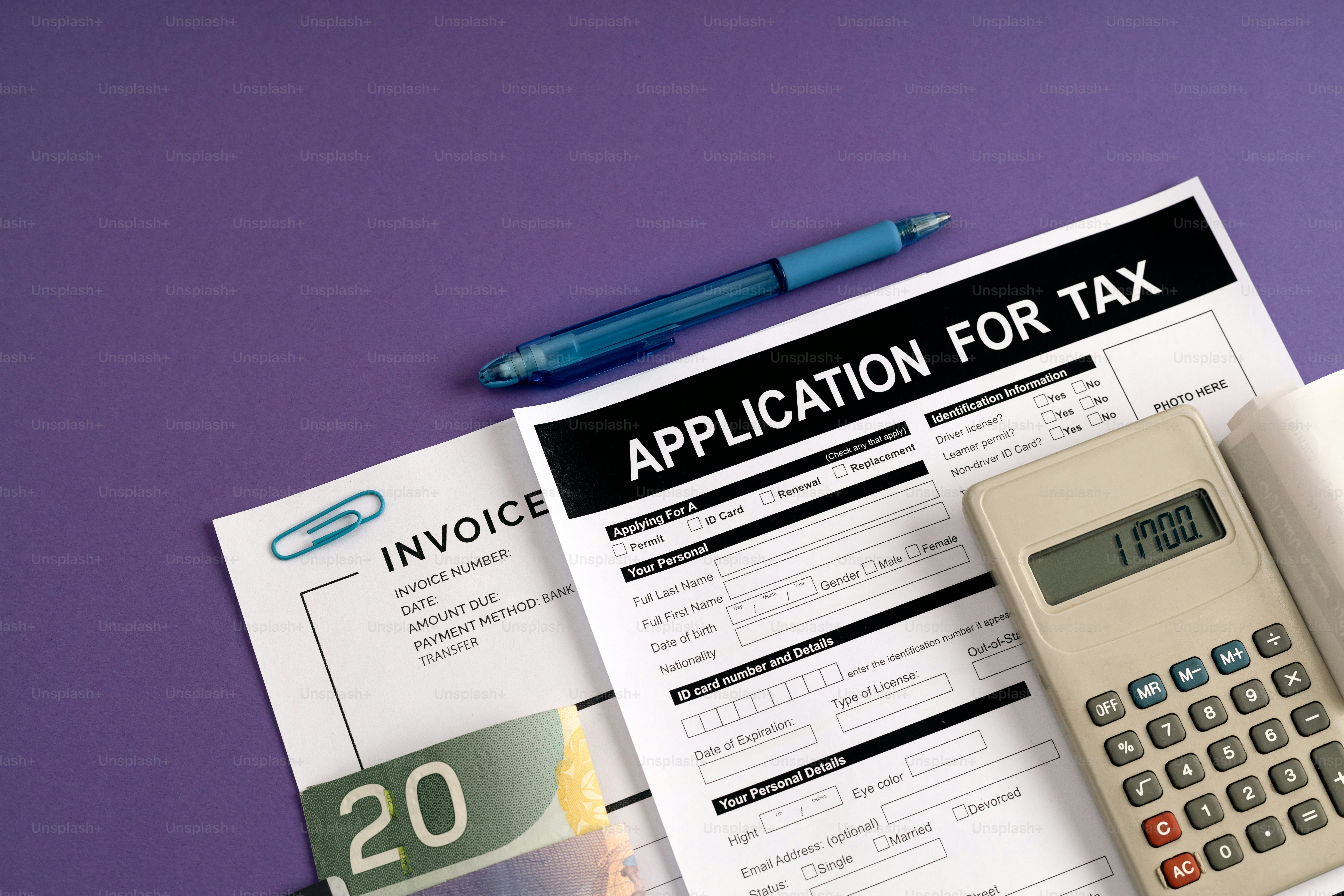 A tax refund form next to a calculator and pencil photo – Tax Image on ...