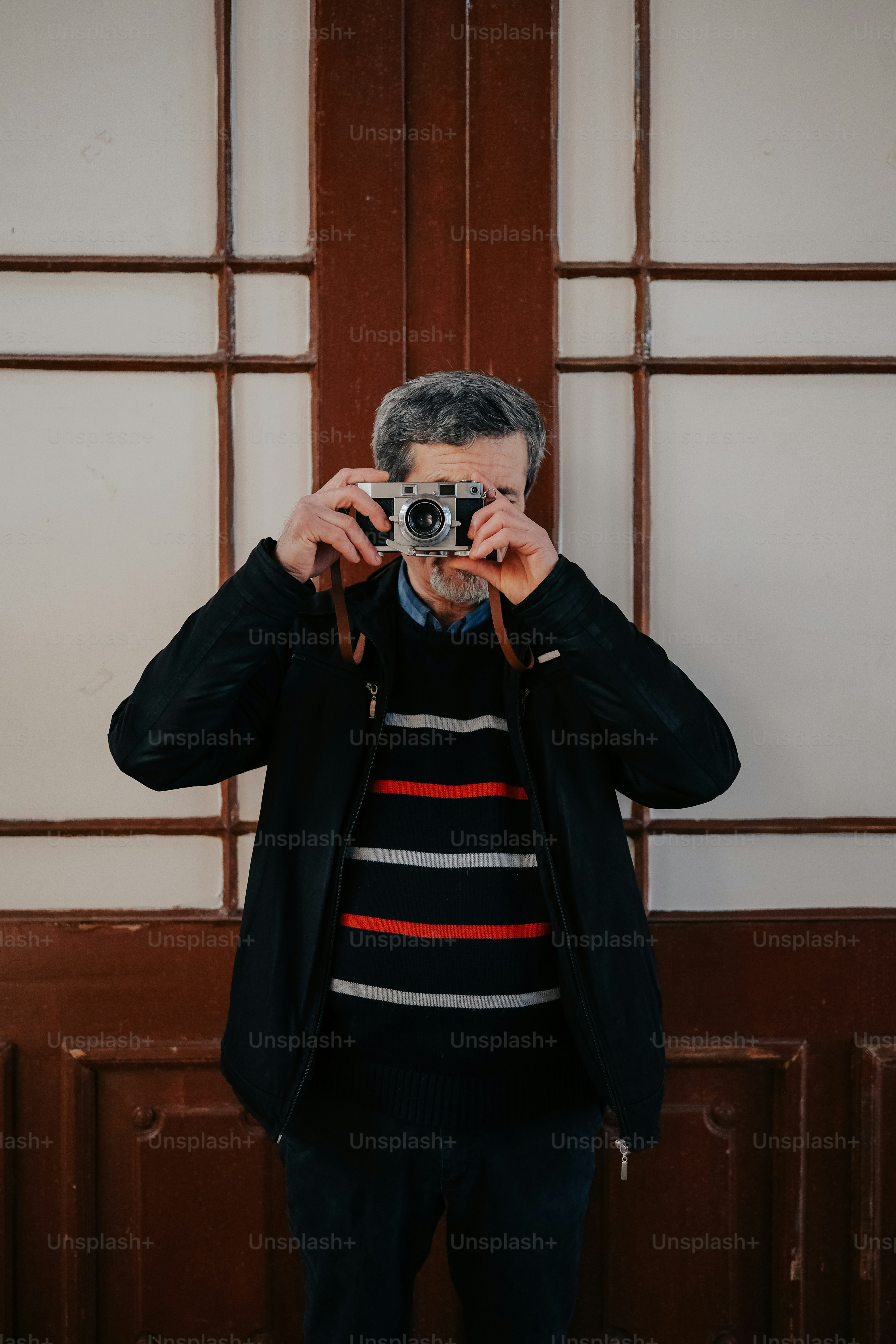 A man taking a picture of himself with a camera photo – Grandparent ...