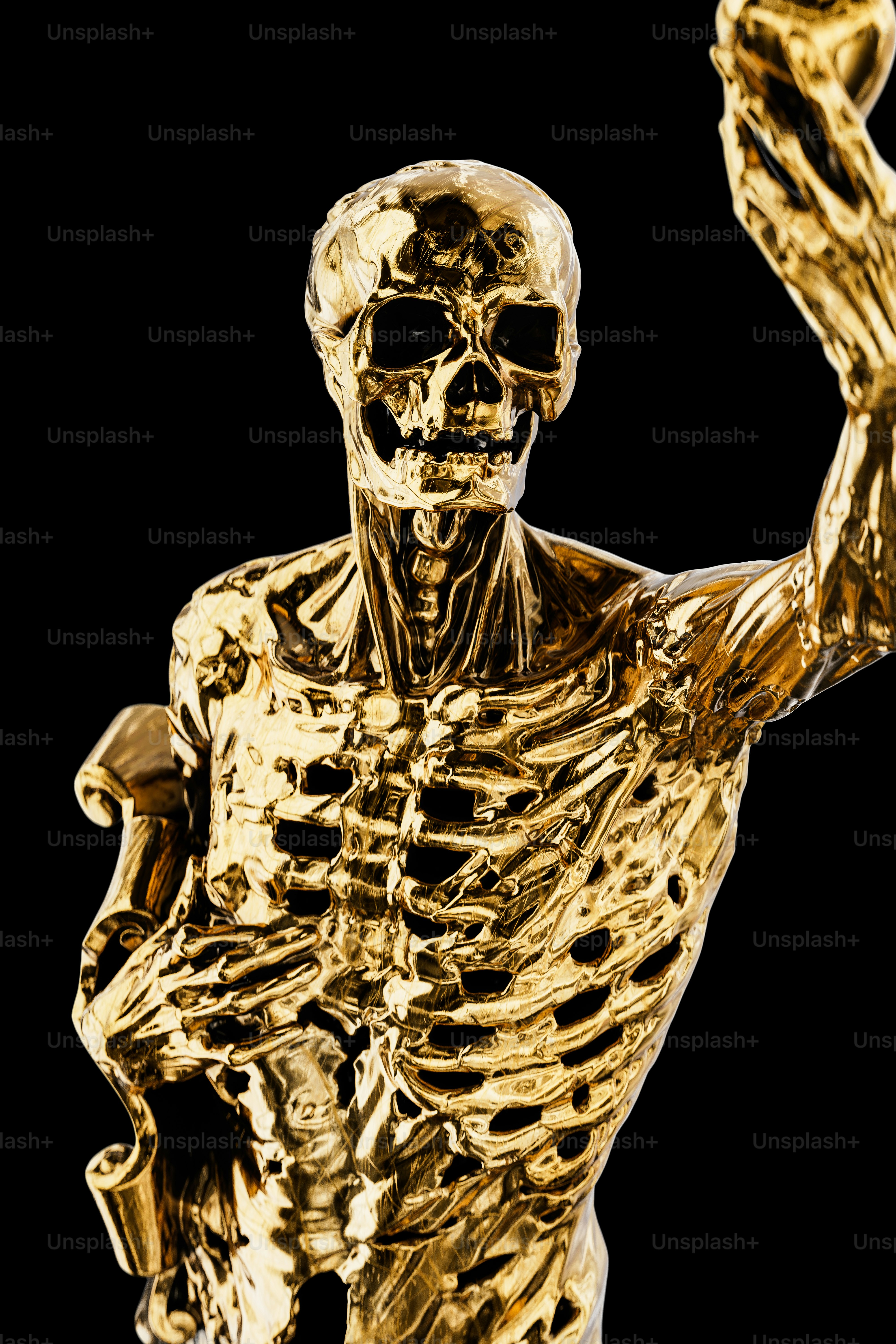 A gold statue of a skeleton holding a tennis racquet photo – Skeletons ...