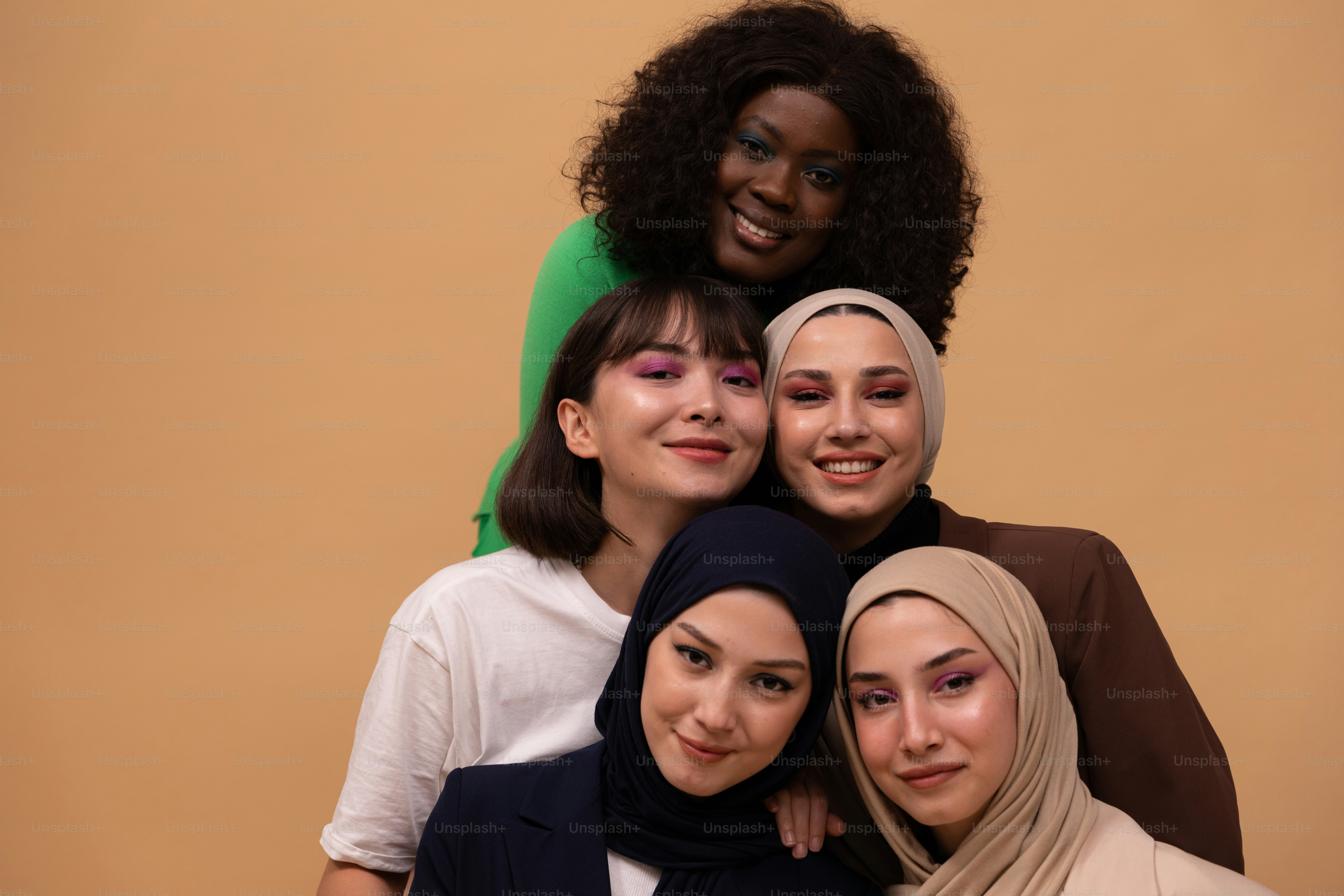 A group of women standing next to each other photo – Group of women ...