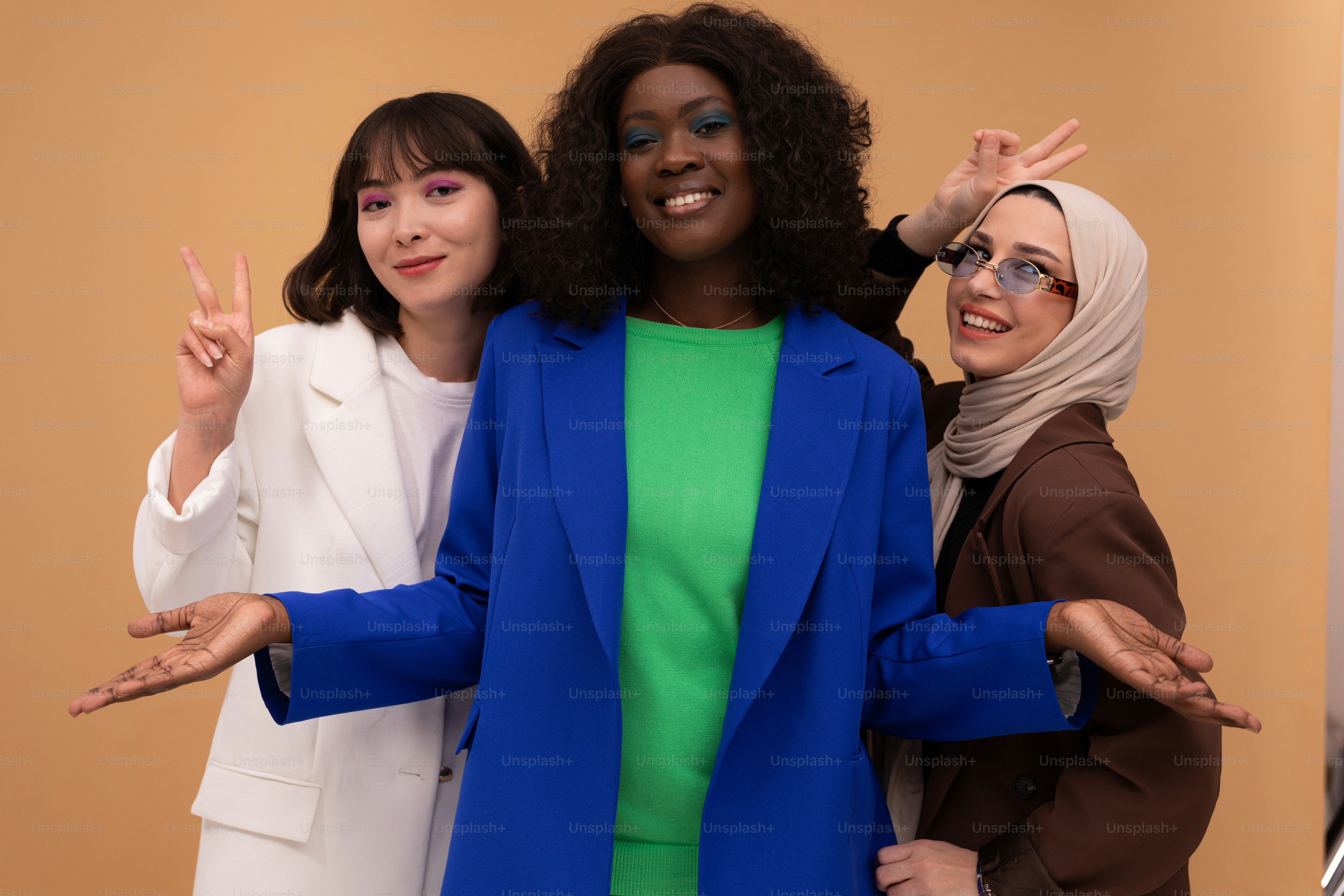 A group of three women standing next to each other photo – Girlhood ...
