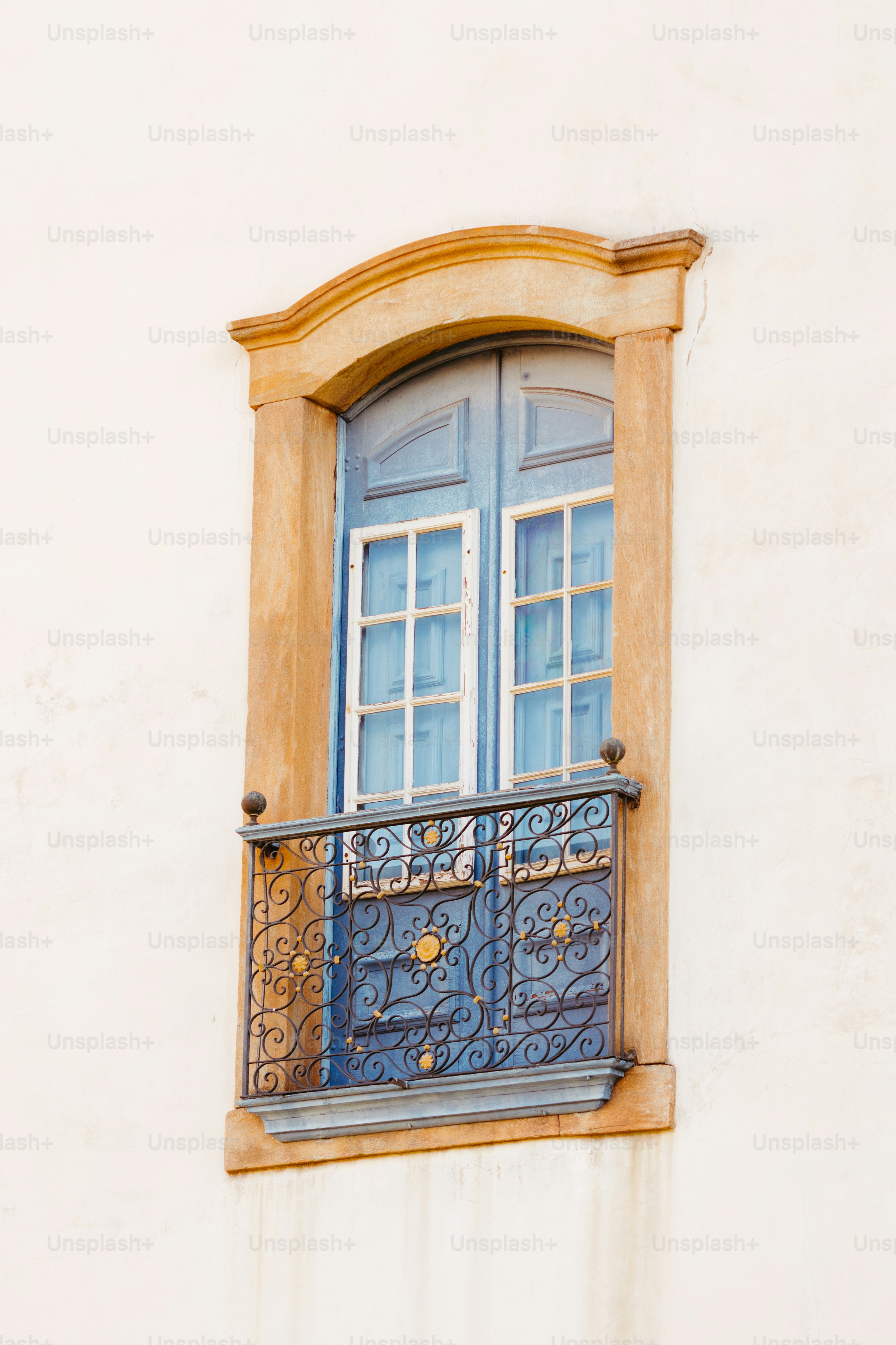 A red and blue window box with flowers on it photo – Flower bed Image ...