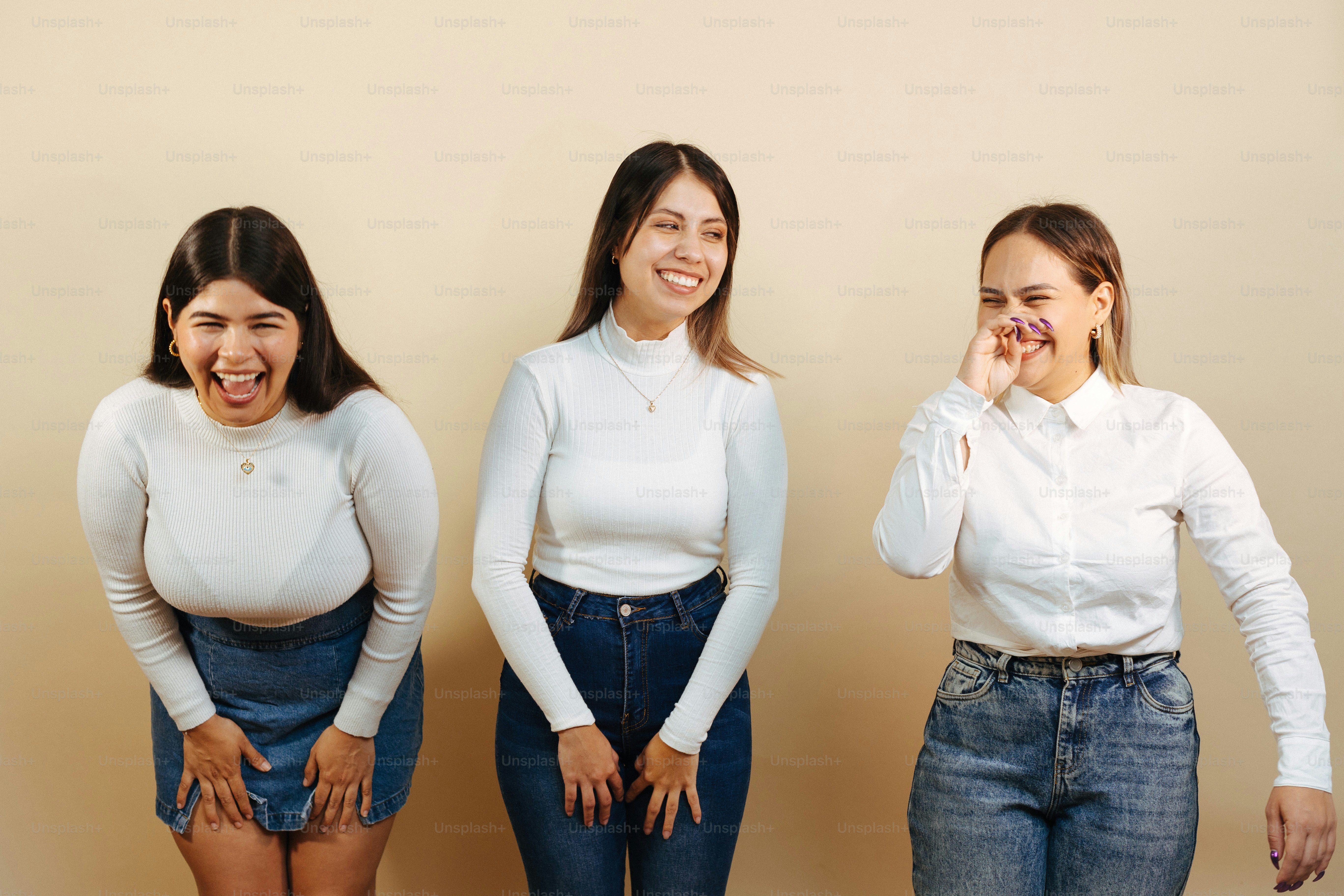 A group of three women hugging each other photo – Bonding Image on Unsplash