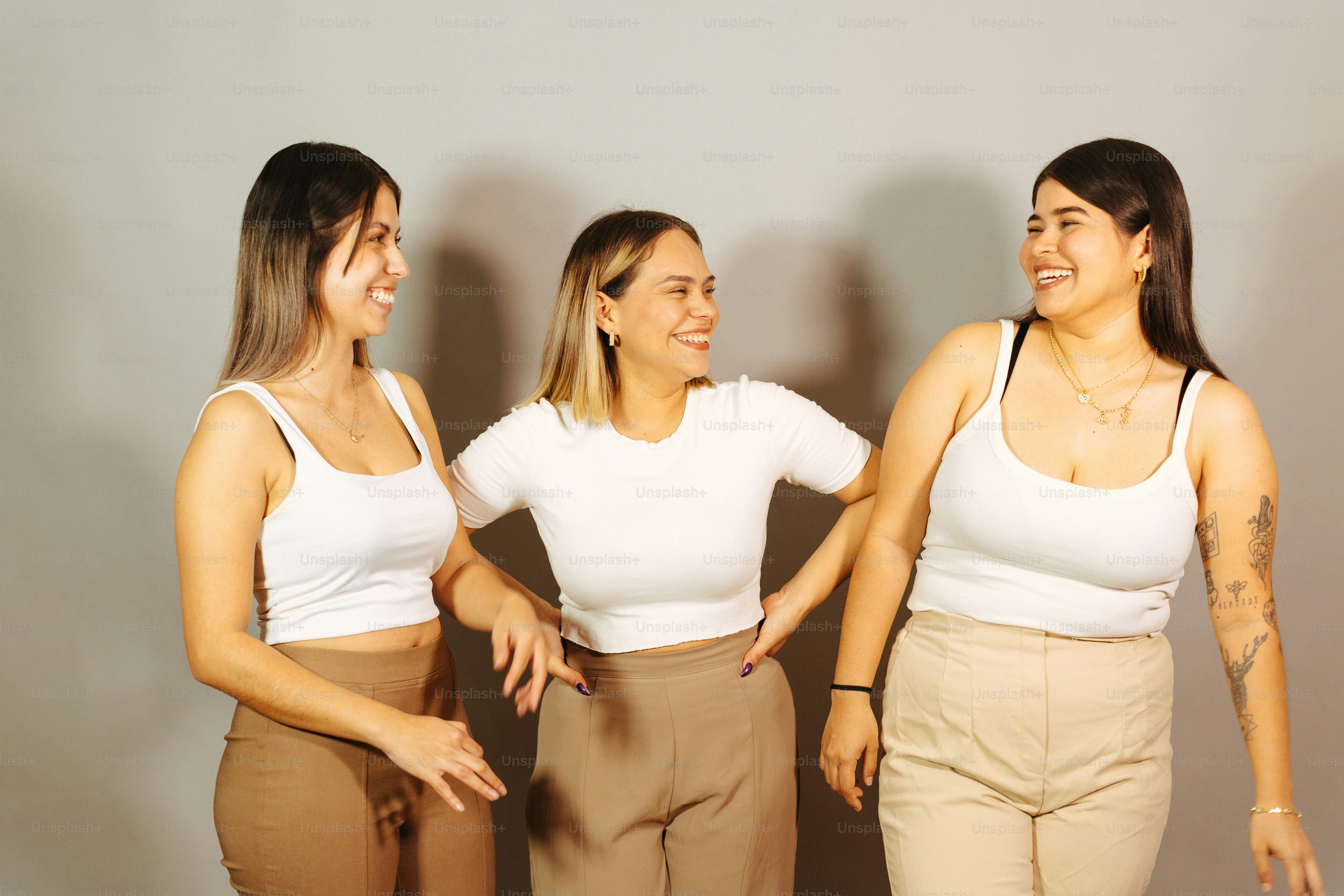 A group of three women standing next to each other photo – Sisterhood ...