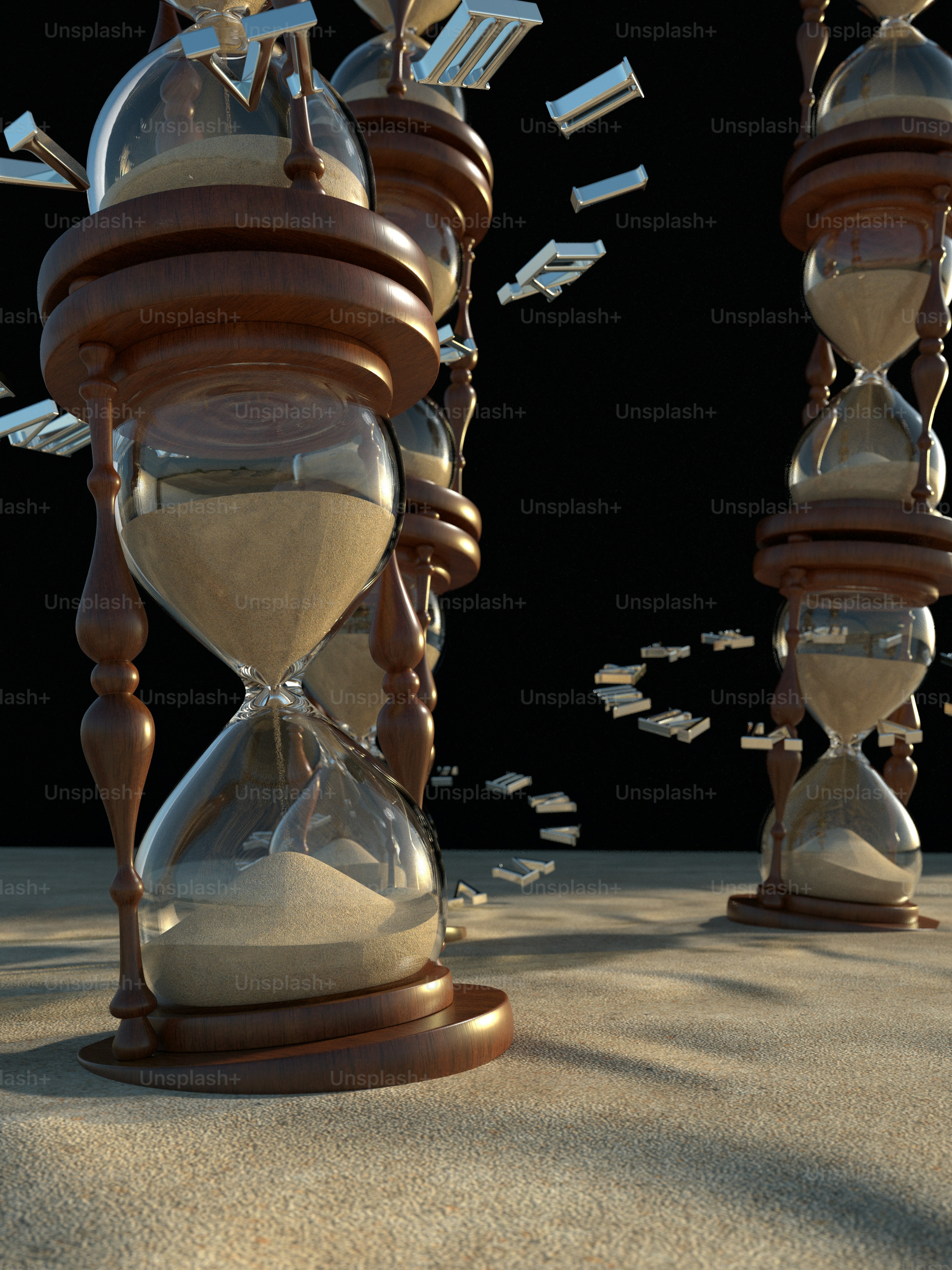 A sand clock sitting on top of a sandy beach photo – Wallpaper Image on ...