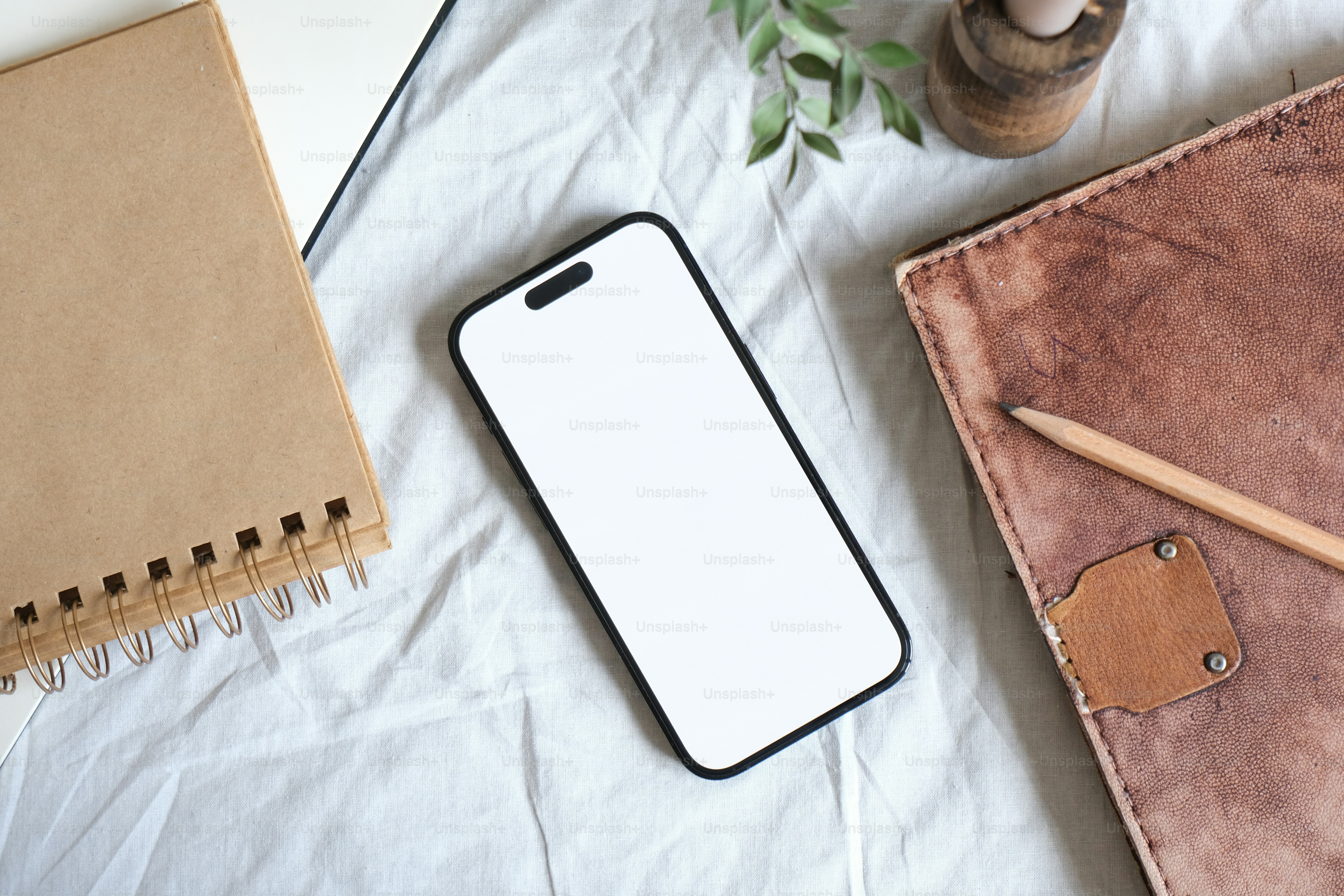A notepad, pen, and notebook on a table photo – Mockup phone Image on ...