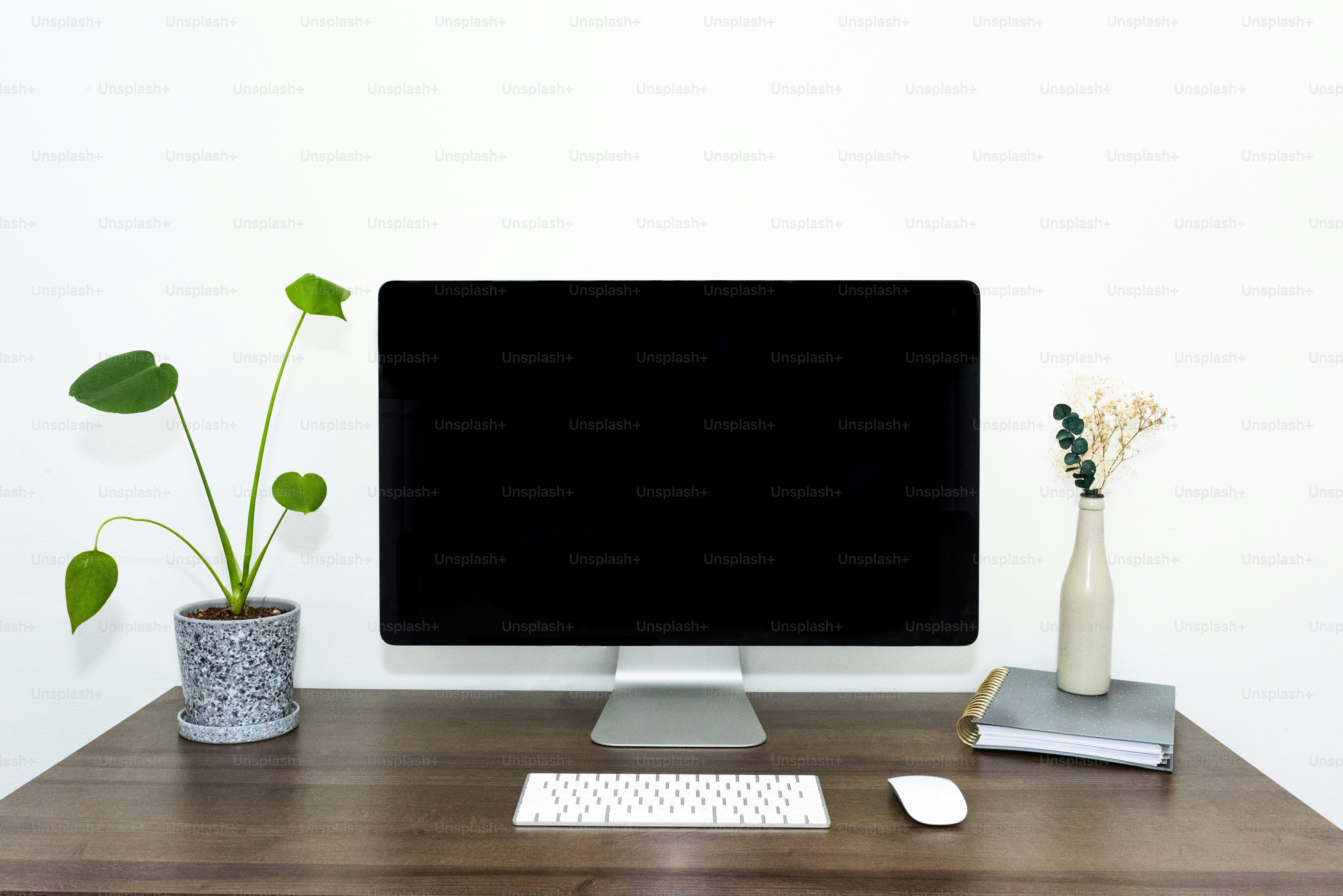 A computer monitor sitting on top of a wooden desk photo – Mockup Image ...