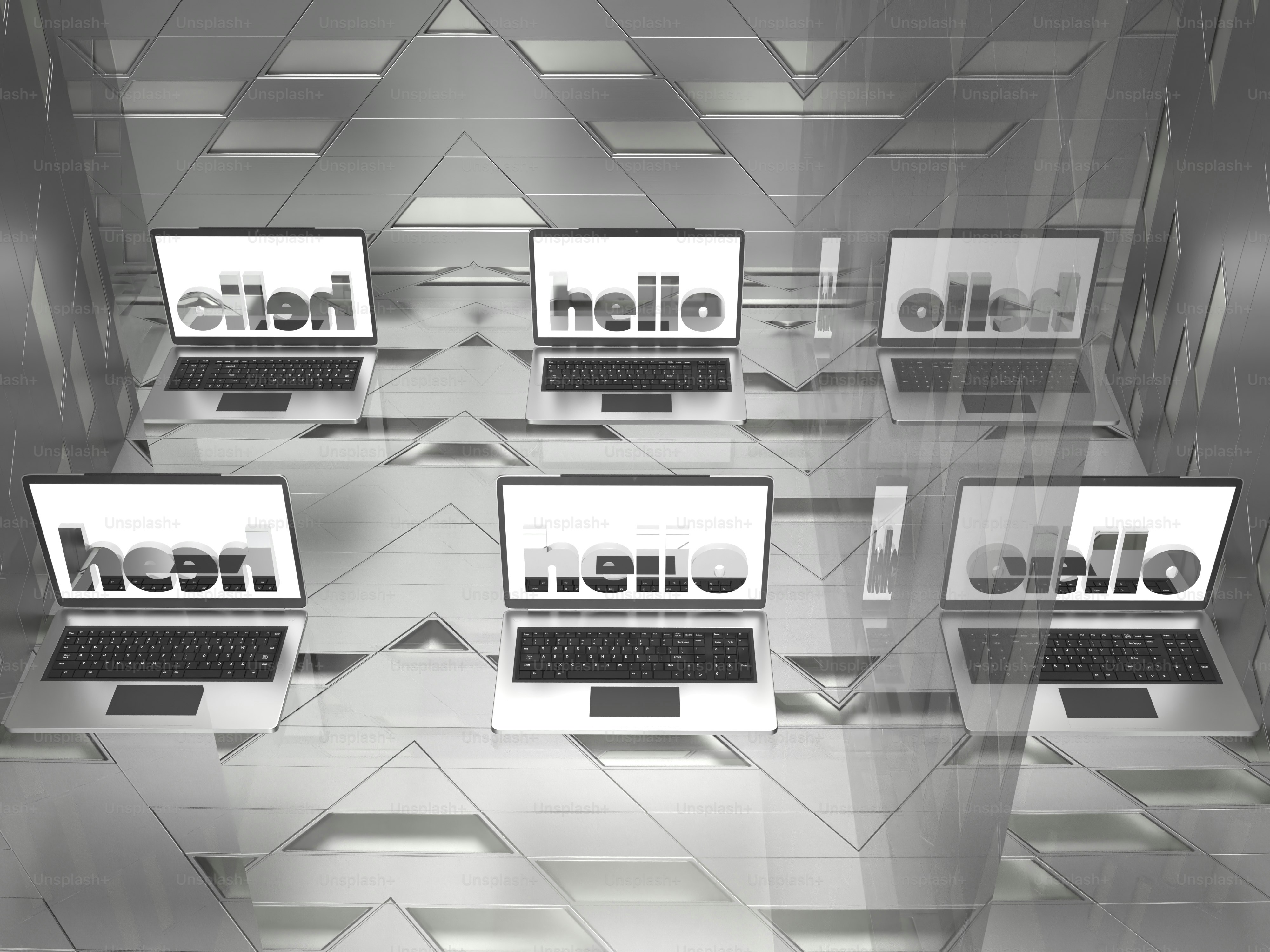 A group of laptops sitting on top of each other photo – Hello world ...