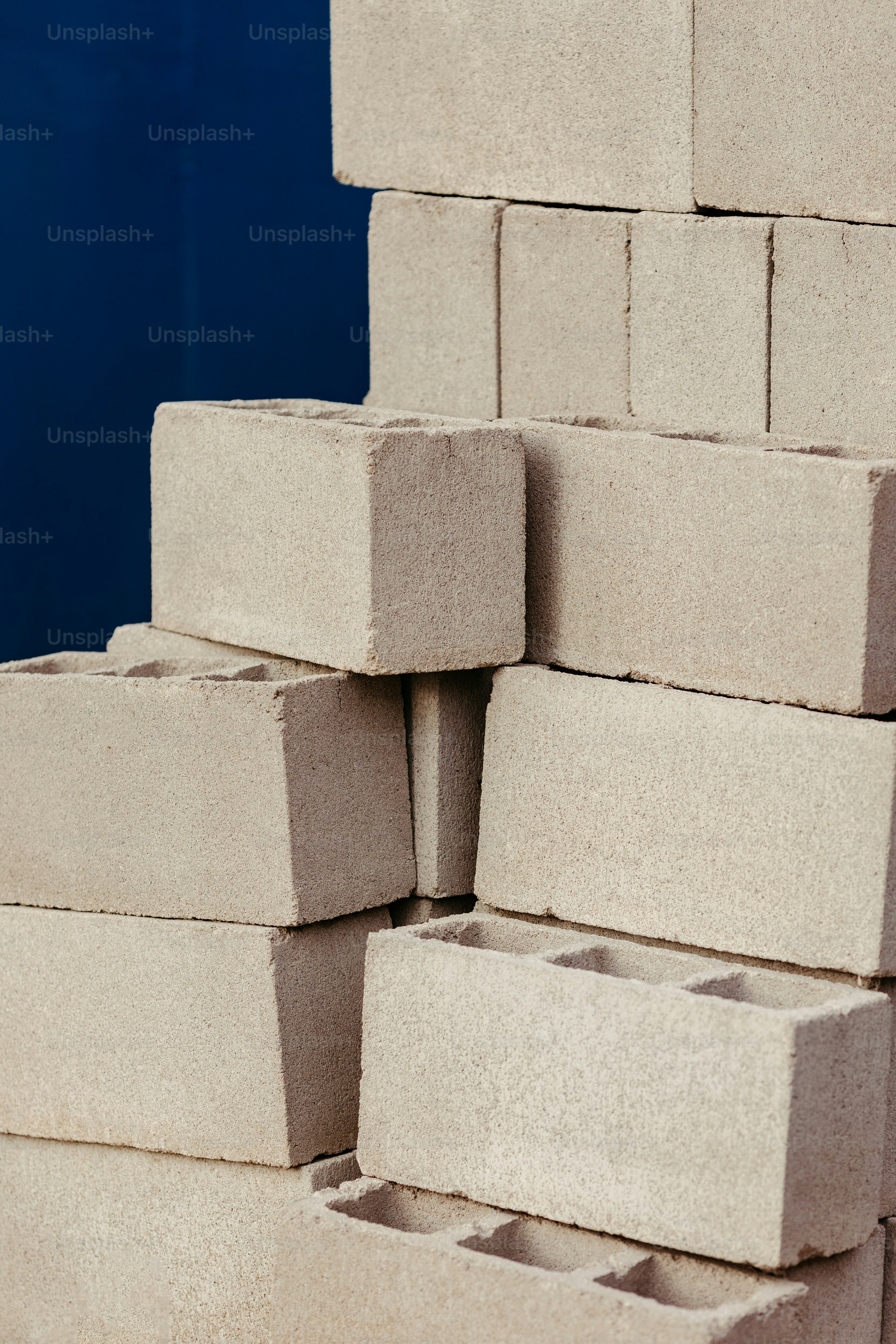 A stack of cinder blocks sitting next to each other photo ...