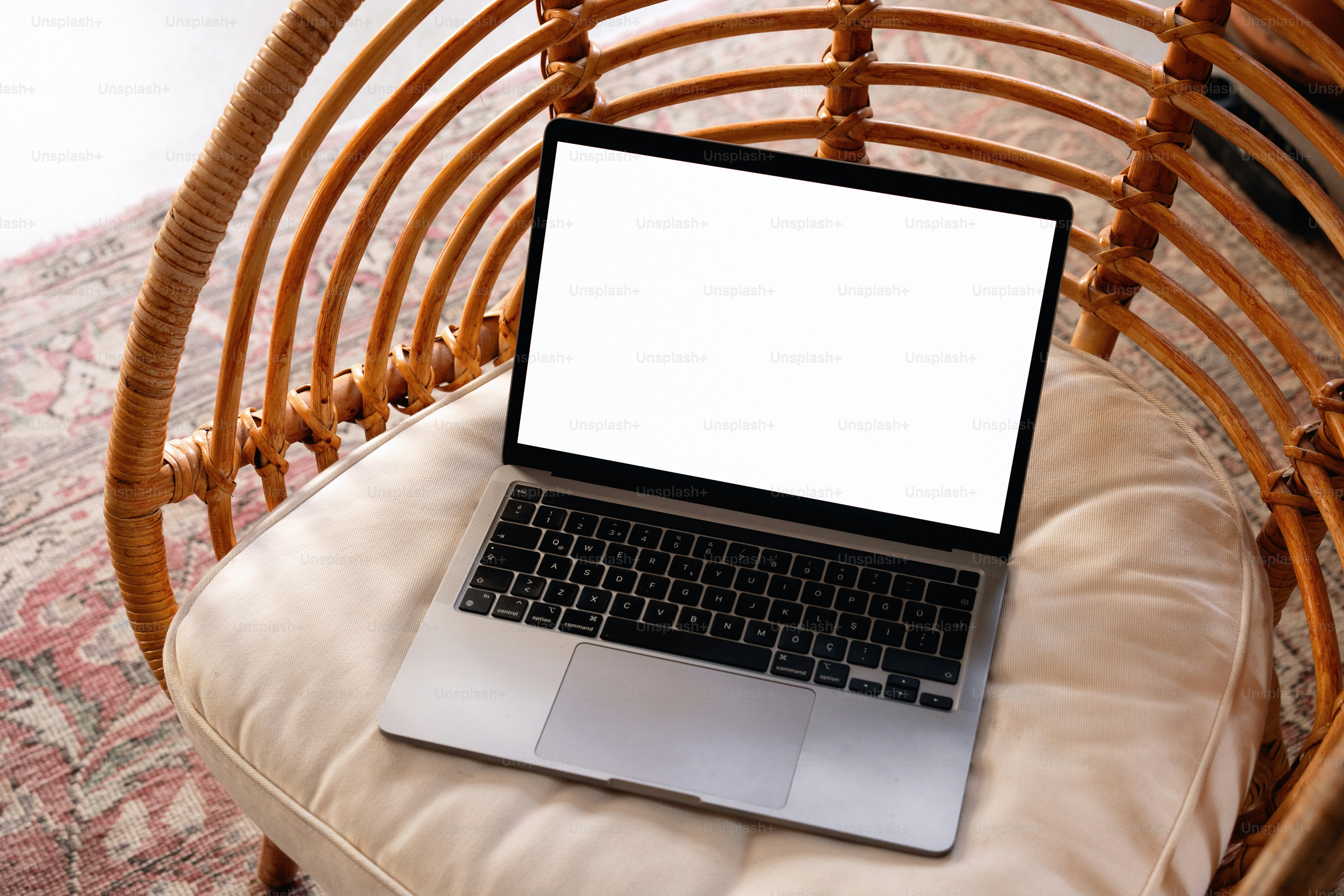 A laptop computer sitting on top of a wooden table photo – Laptop Image ...