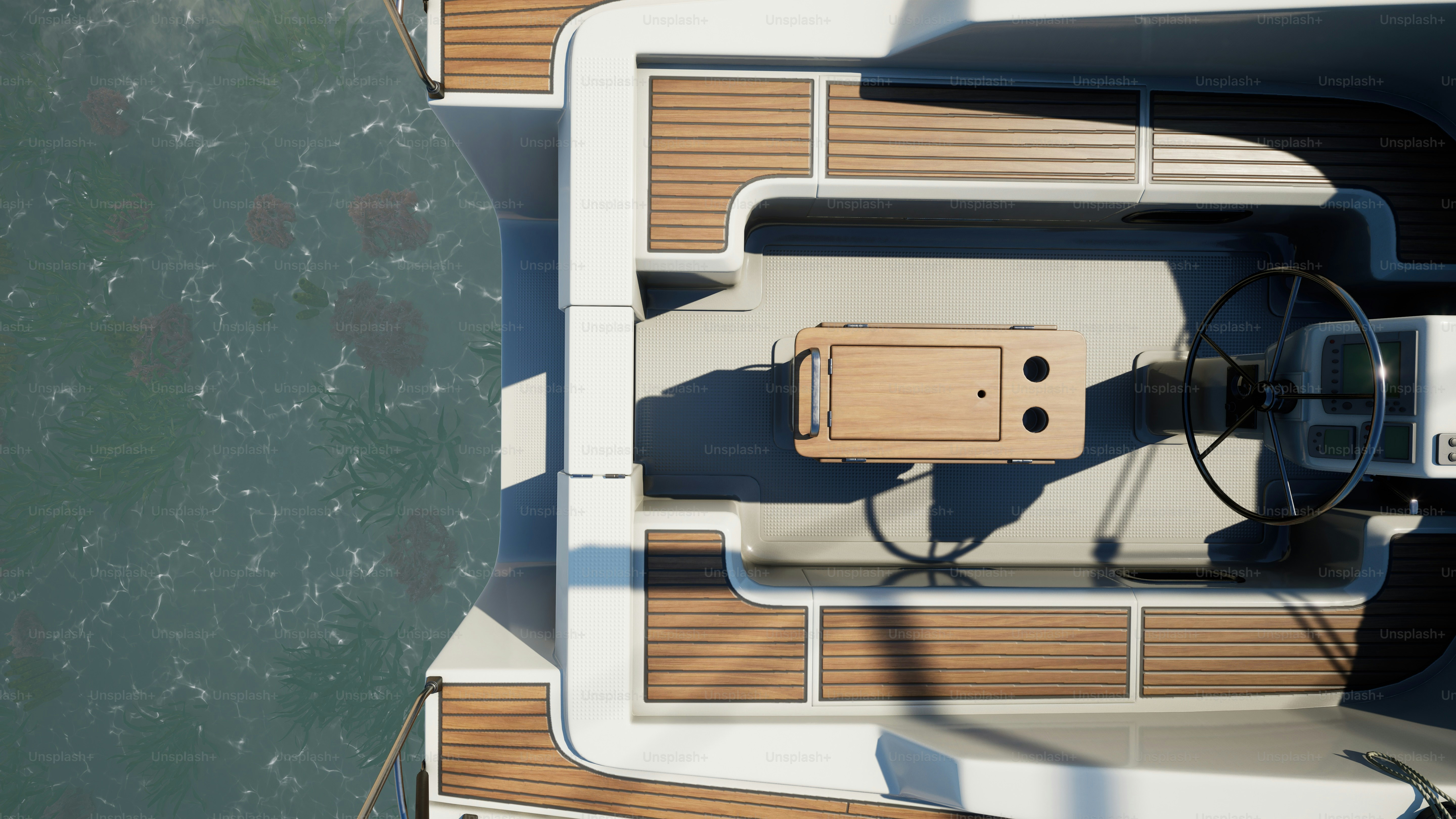 An overhead view of a boat with a steering wheel photo – Yacht Image on ...