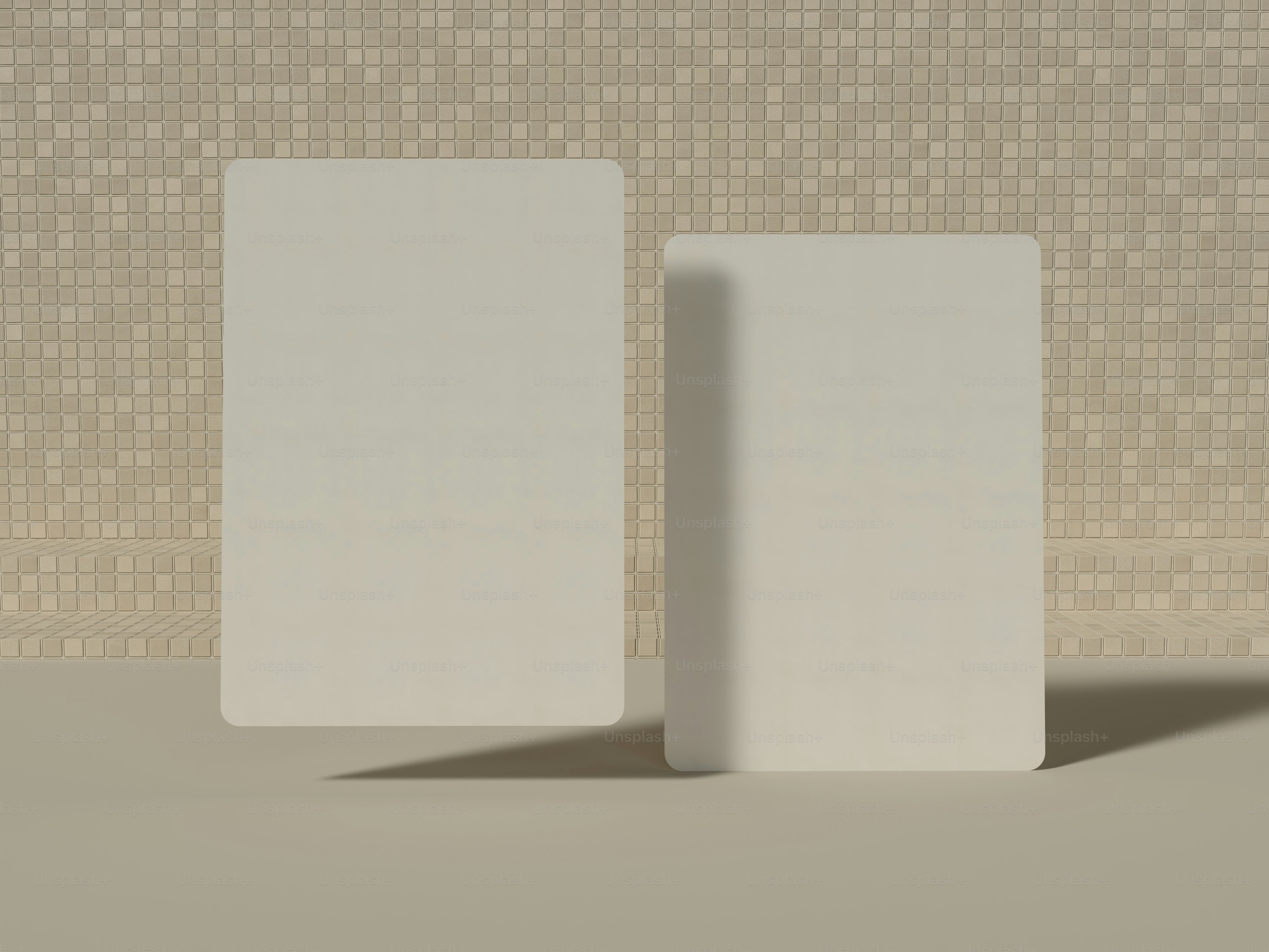 A pair of white square stands in front of a brick wall photo ...